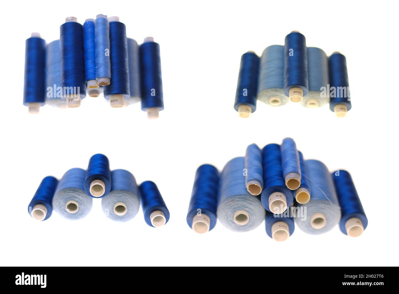 Sewing threads set.Blue and gray thread spools isolated on white ...