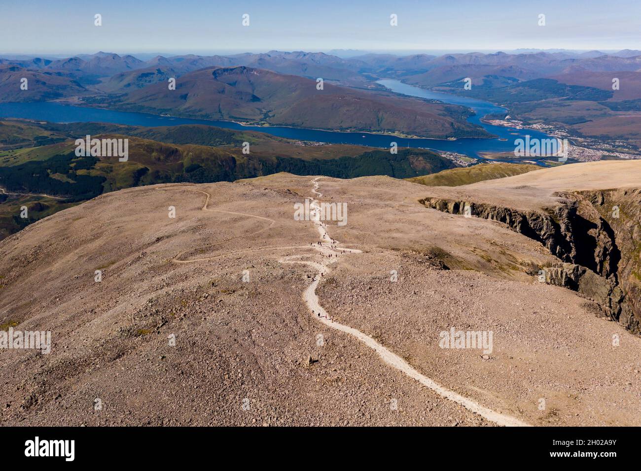 Aerial view of the footpath to the summit of Ben Nevis with several sea ...