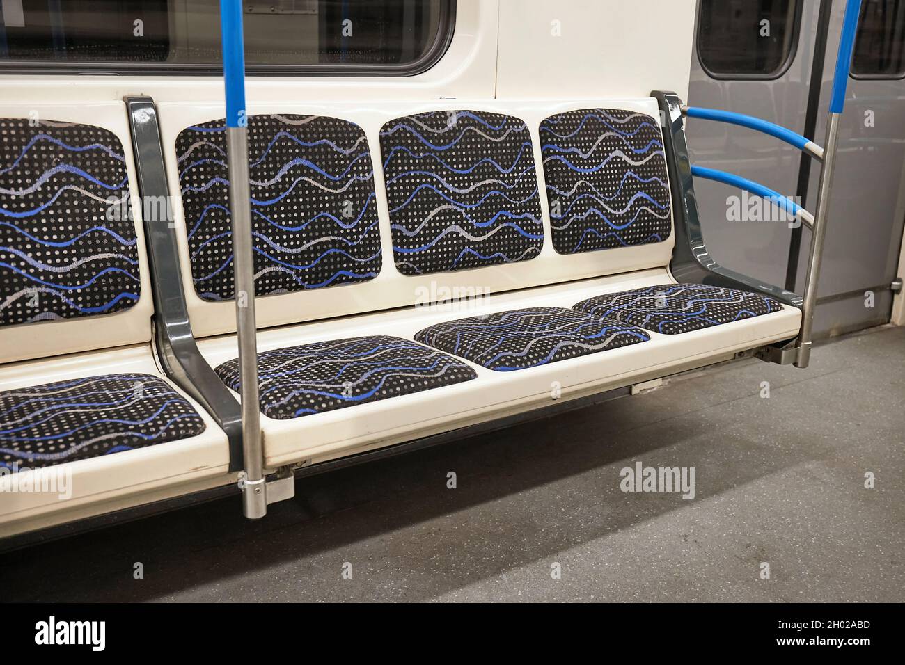 Metro empty seats ride Stock Photo - Alamy