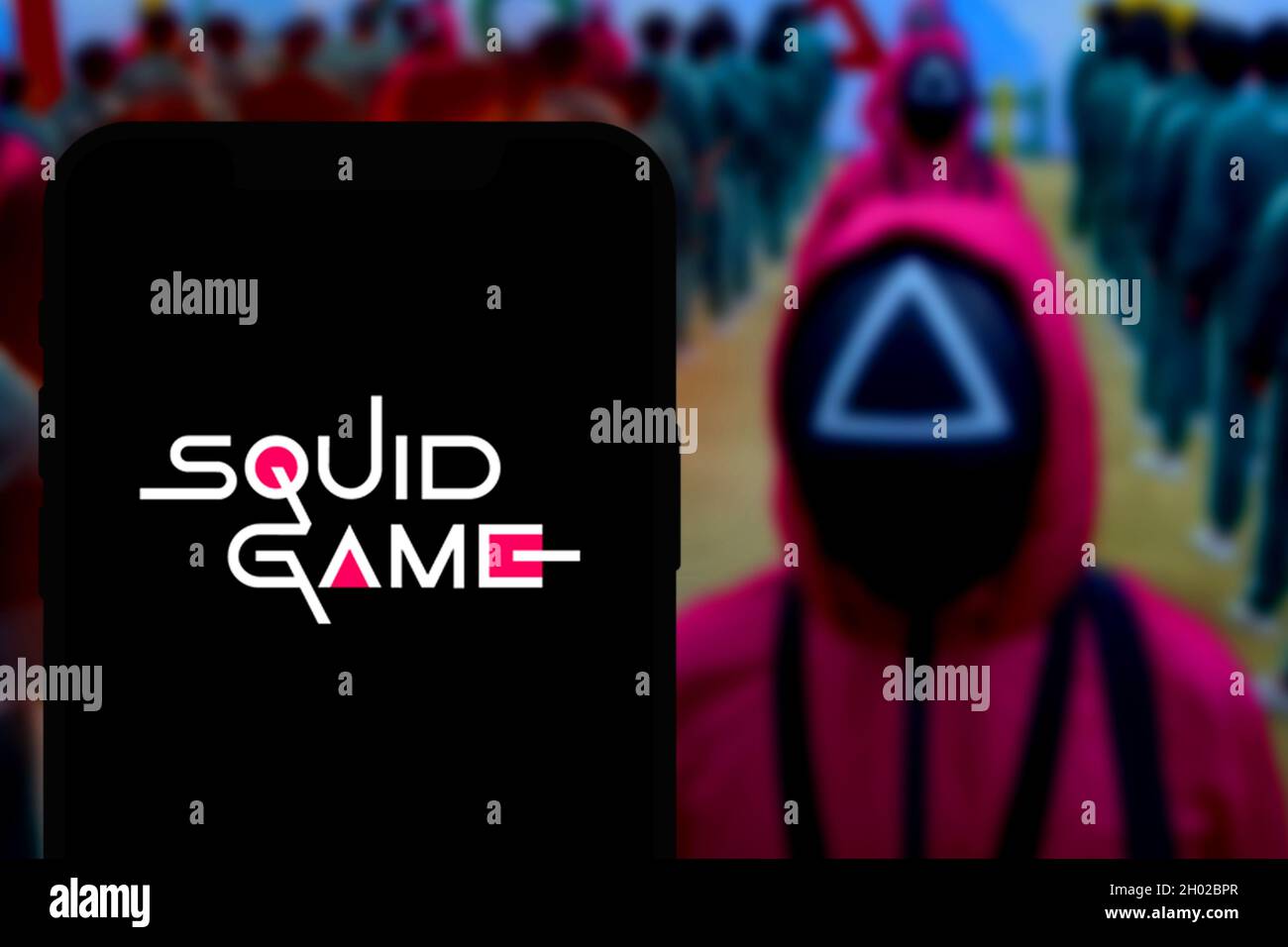 Smartphone with the logo of "The Squid Game" (Hangul: 오징어 게임; RR ...