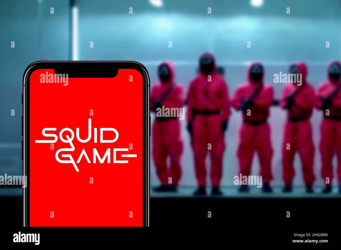 Smartphone with the logo of "The Squid Game" (Hangul: 오징어 게임; RR ...