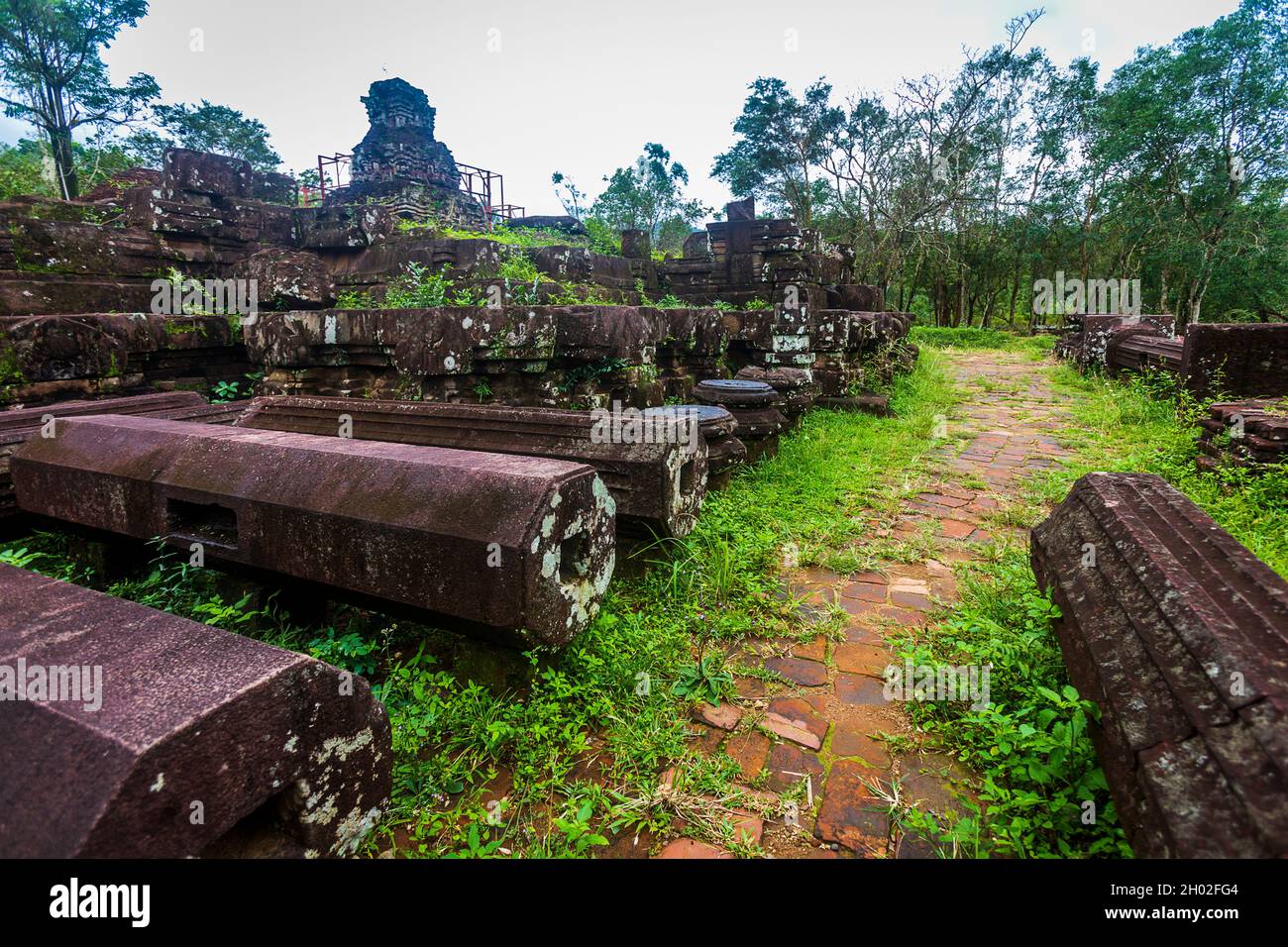 Pillars and other building parts laying on the ground at the ruins of ...