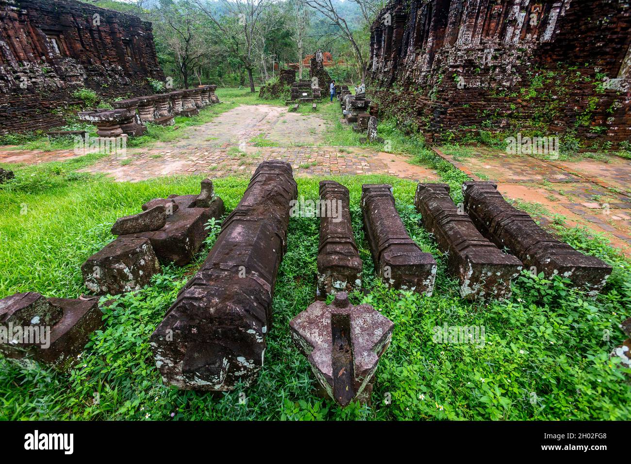 Pillars and other building parts laying on the ground at the ruins of ...