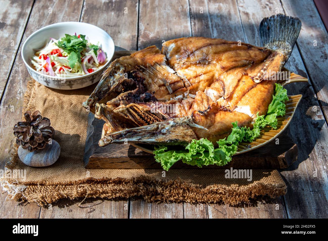 Deep fried Snapper with fish sauce on vintage wooden, The perfect ...