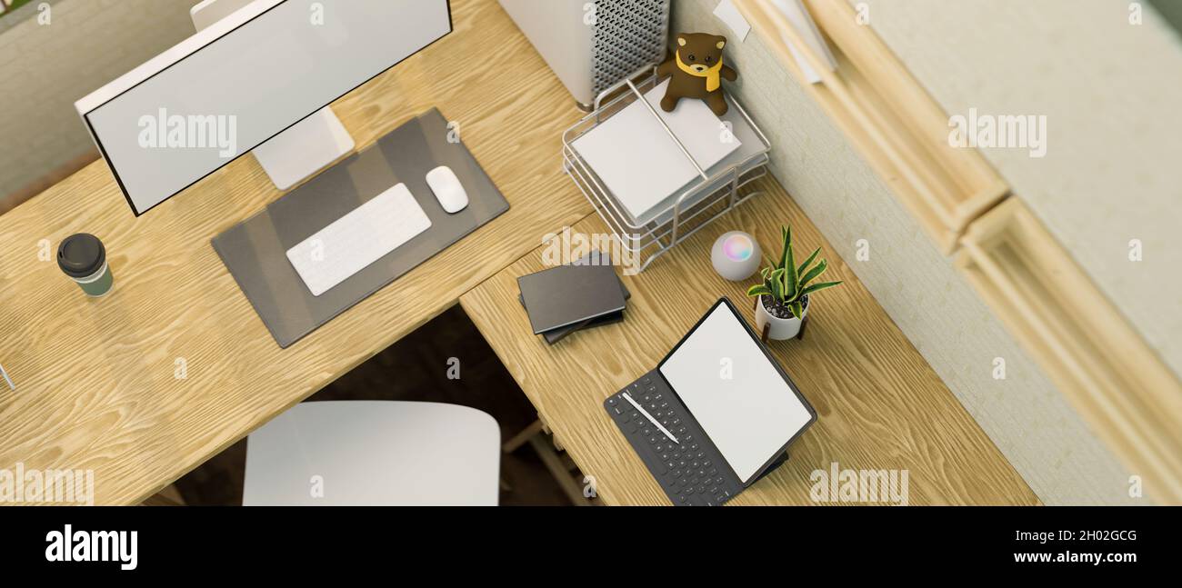 Top view of a L-shape wooden computer desk with modern computer and ...