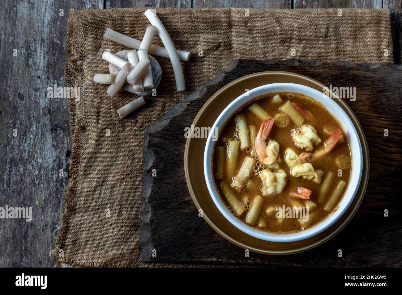 Sour soup with lotus stem and shrimps (kaeng som koong with lotus stem ...