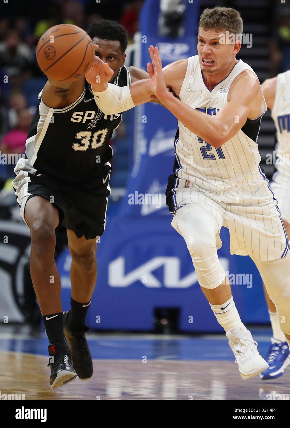 Orlando Magic center Moritz Wagner (21) and San Antonio Spurs forward ...