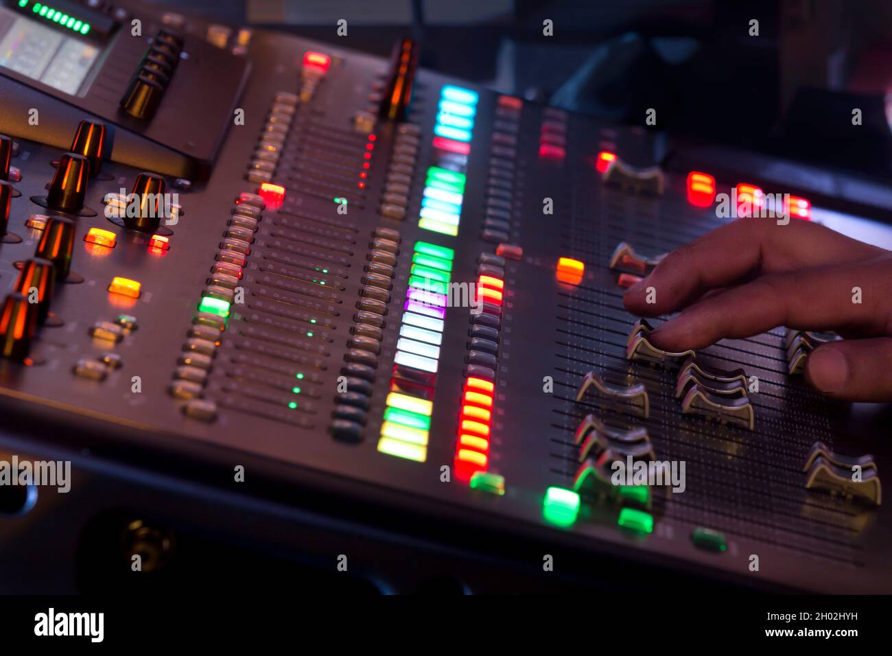 Adjust sound mixer switch in concert Stock Photo - Alamy
