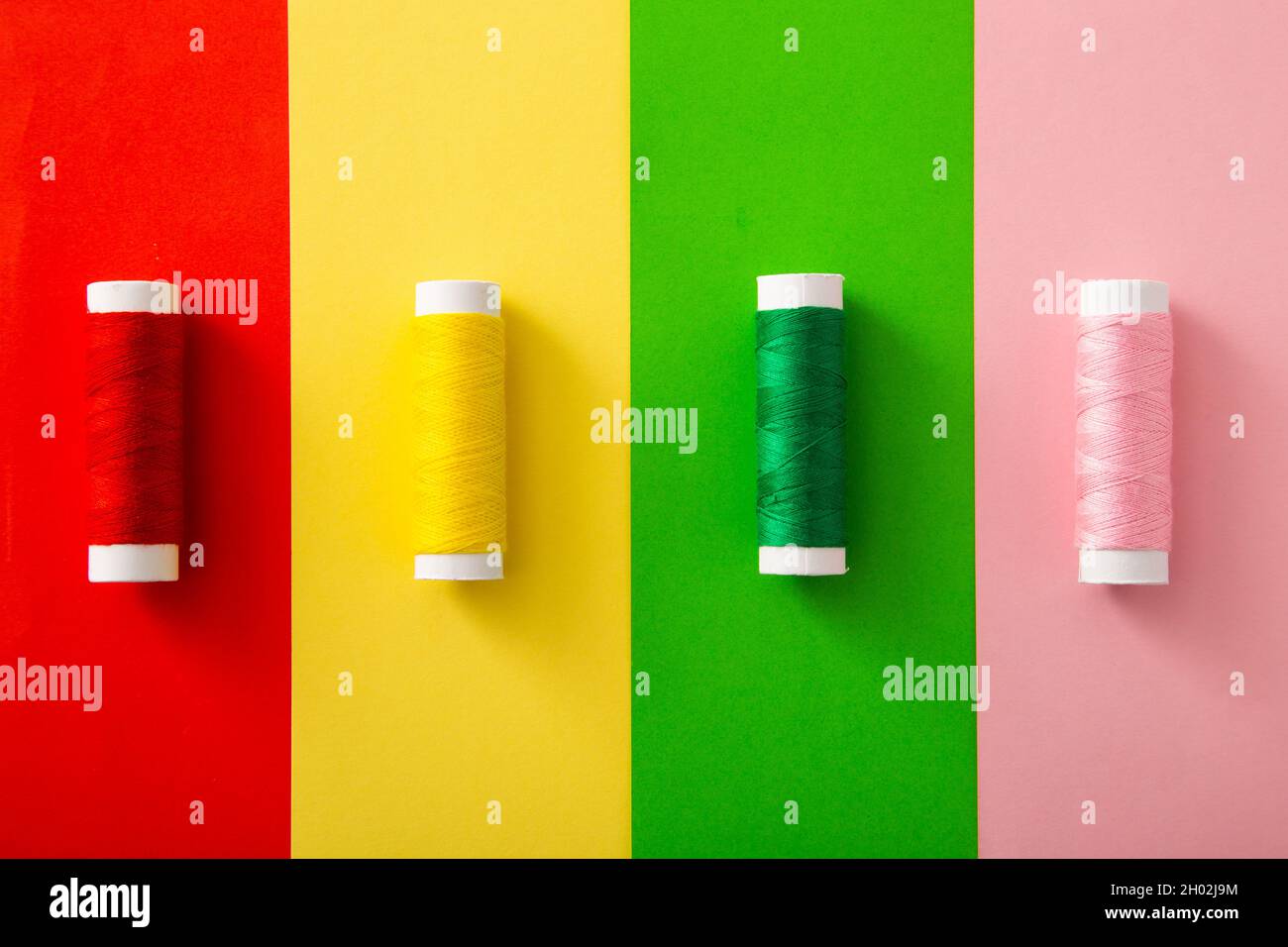 Colorful threads on colorful background (Flat lay Stock Photo - Alamy