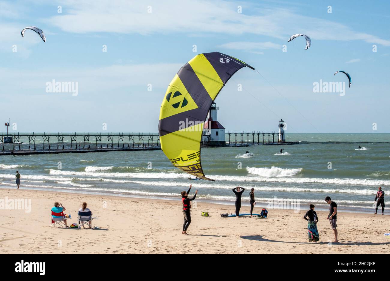 St Joseph MI USA, Sept 26, 2021; active people surf and kite board on ...