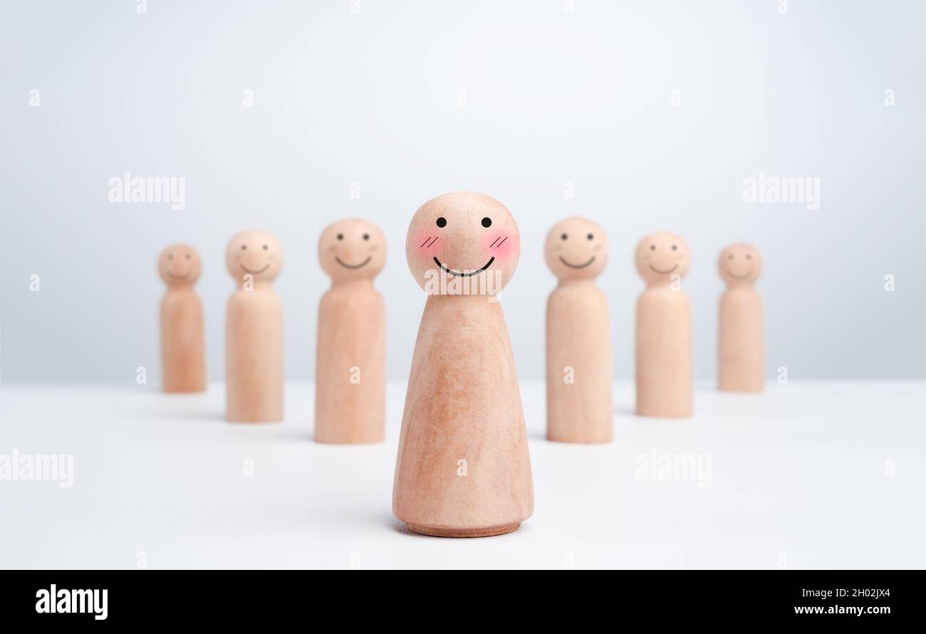 Leader girl, influencer, wooden figure, Smiling with cute face emoticon ...
