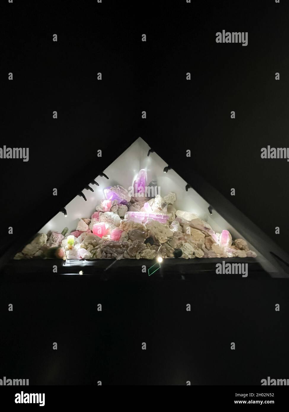 Beautiful gem stones on display in an illuminated case Stock Photo - Alamy