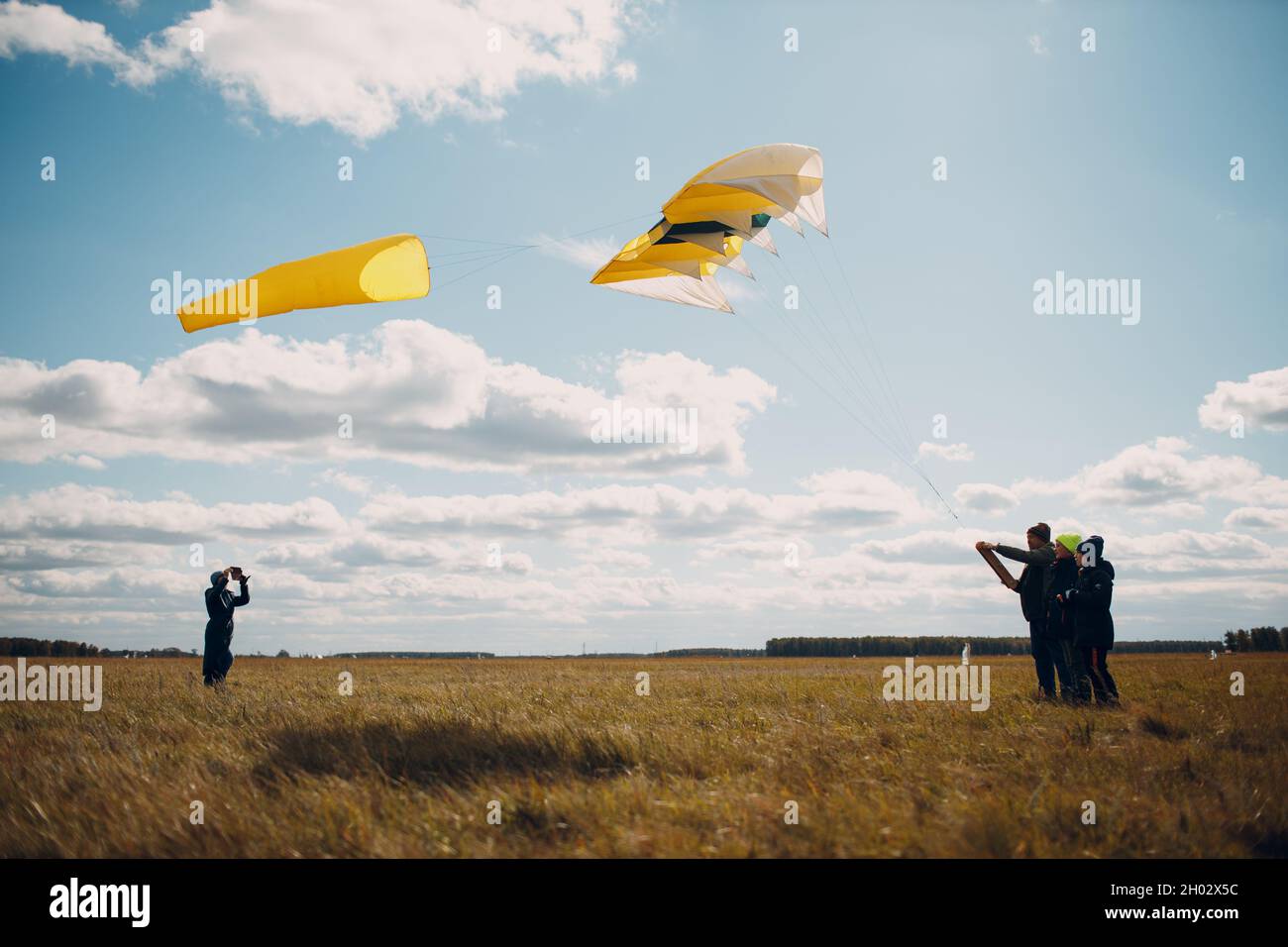 Young man flying a kite hi-res stock photography and images - Alamy