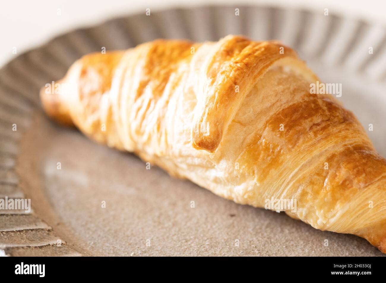 Fresh croissant for family breakfast Stock Photo - Alamy
