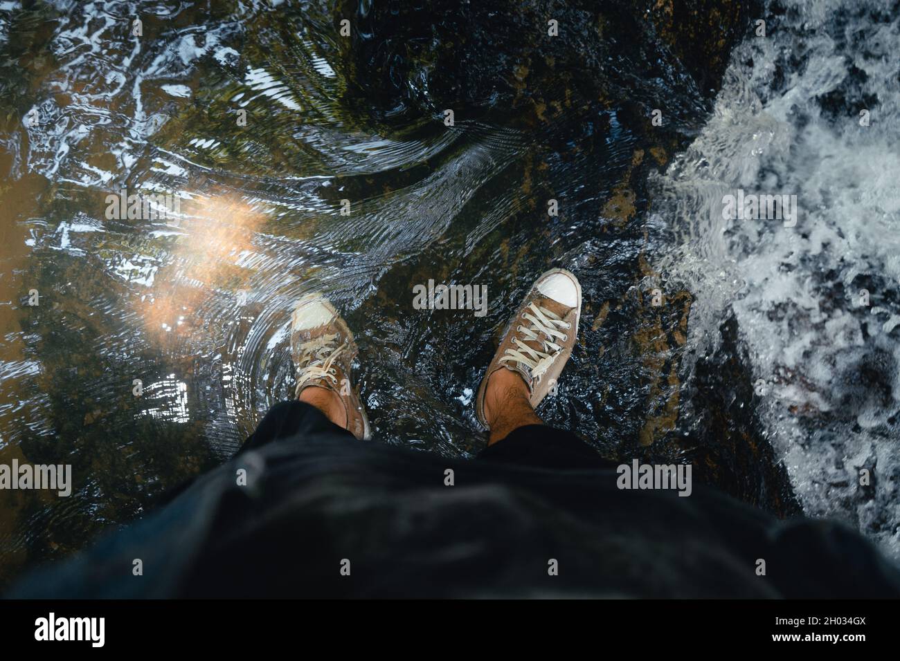 Travel Waterfall in a tropical forest in the daytime Stock Photo - Alamy