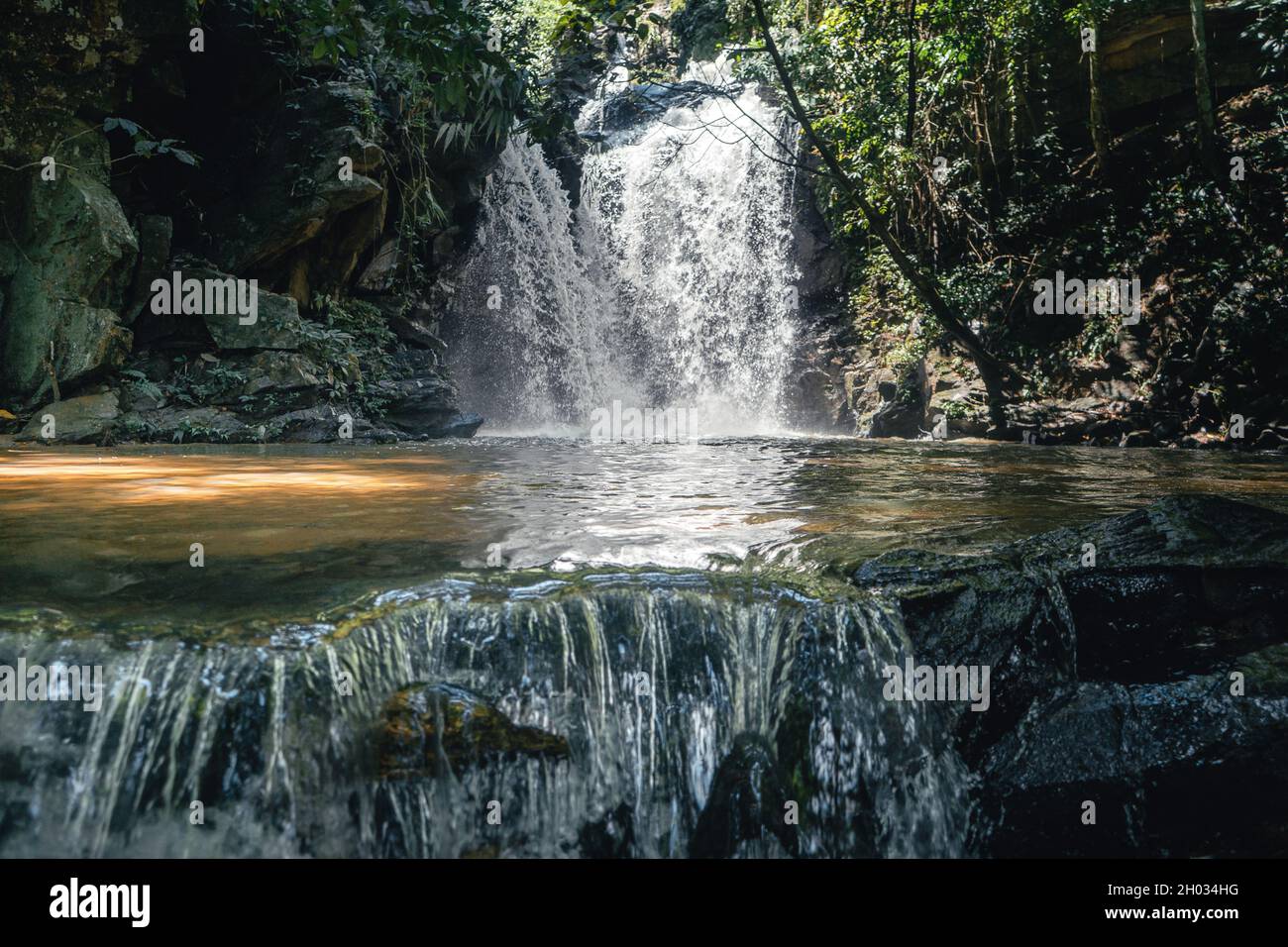 Travel Waterfall in a tropical forest in the daytime Stock Photo - Alamy