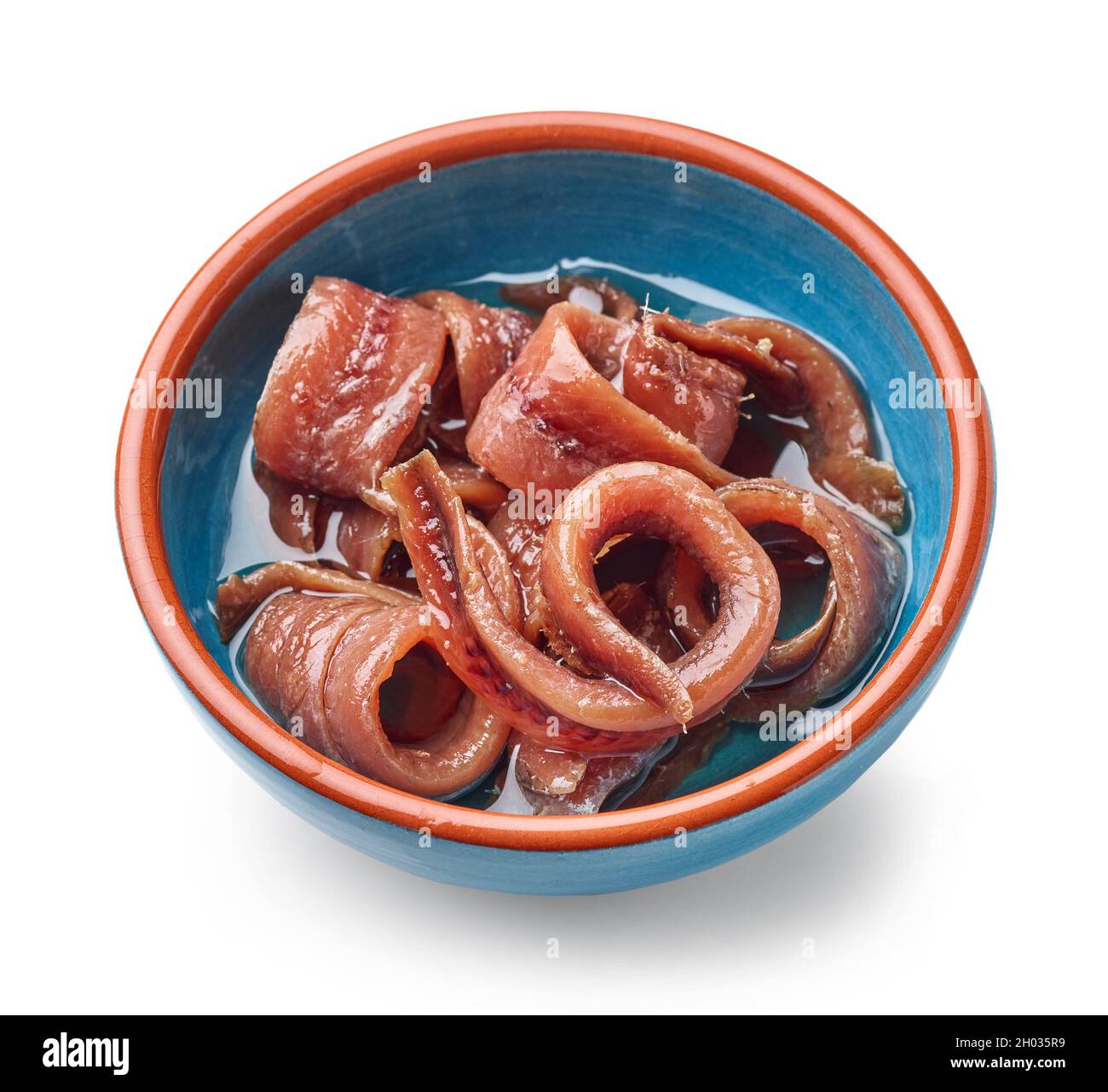 bowl of canned anchovy fillets isolated on white background, top view ...