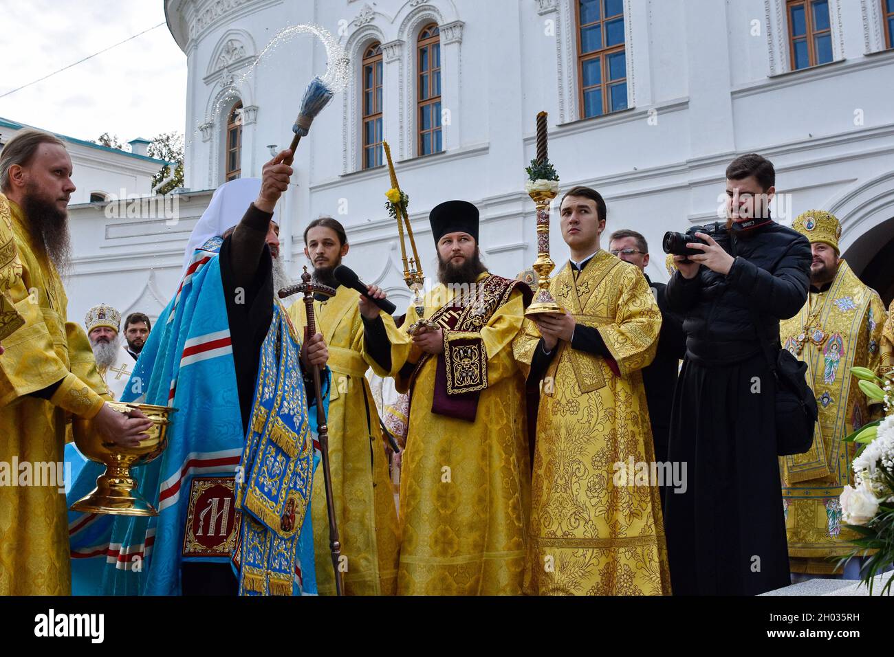 Metropolitan Onufriy and clergy are seen during the celebration in ...