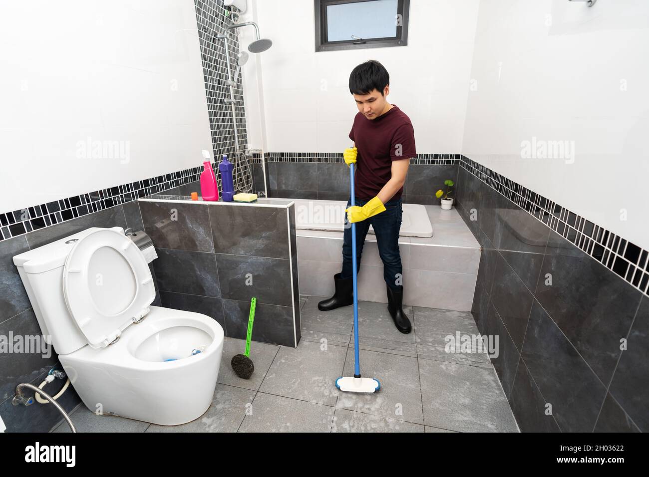Man using toilet hi-res stock photography and images - Alamy