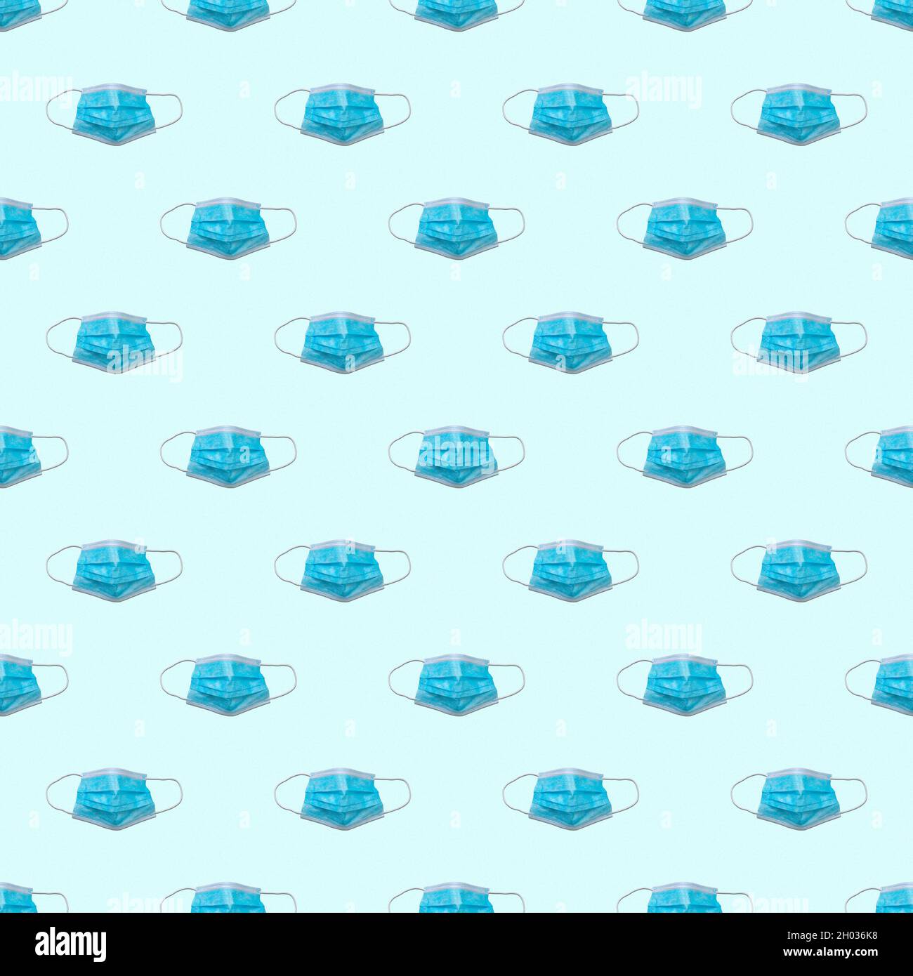 seamless looping pattern with blue medical masks isolated on a pastel ...