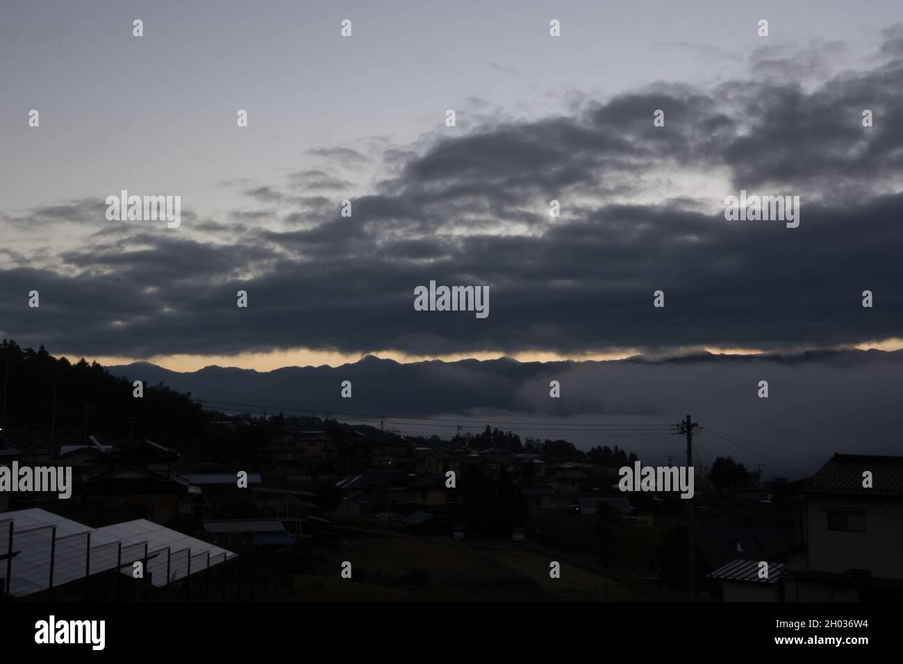 Iida, Nagano, Japan, 2021-11-10, Clouds lighted by the sun during ...
