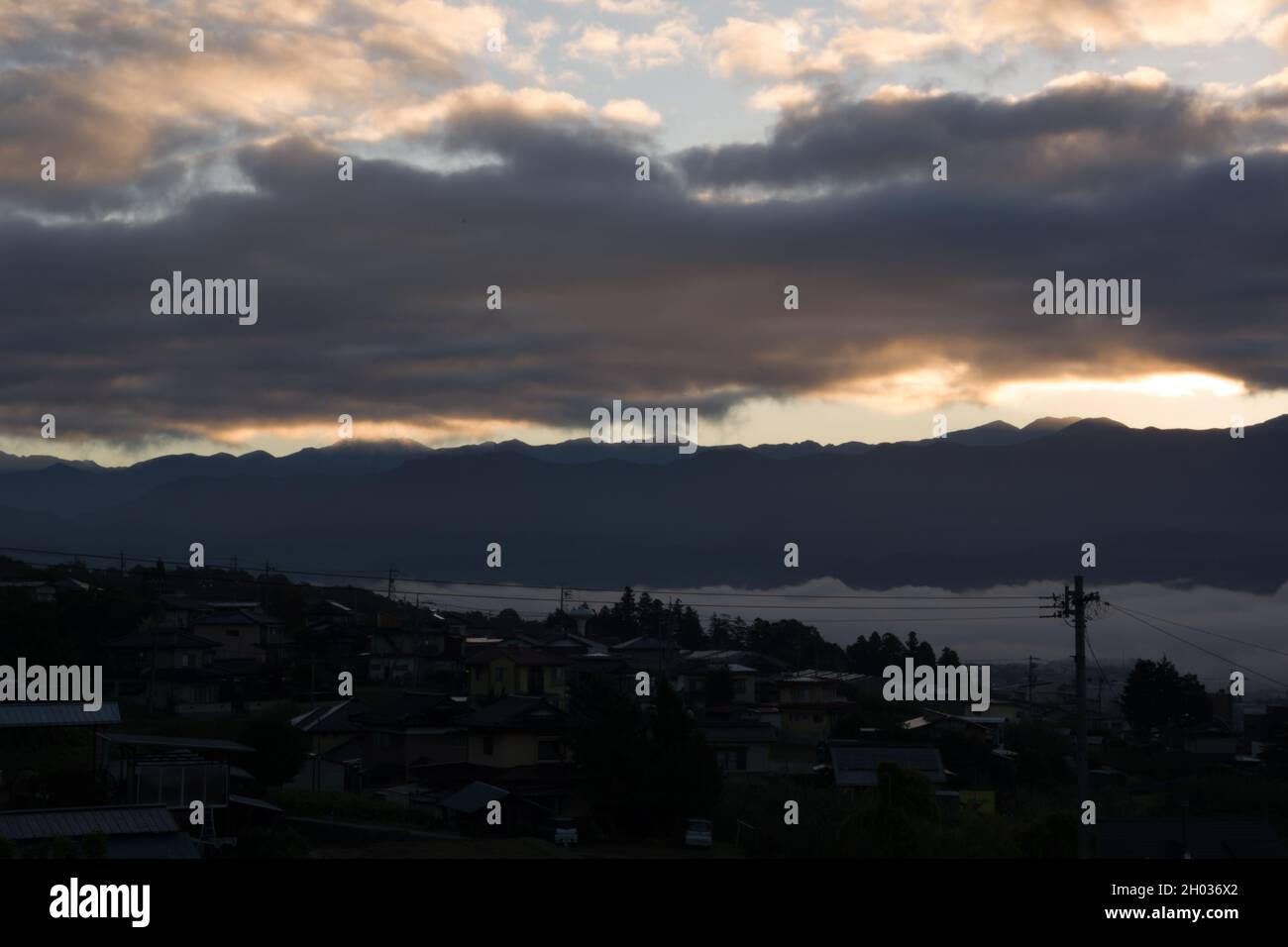 Iida, Nagano, Japan, 2021-11-10, Clouds lighted by the sun during ...