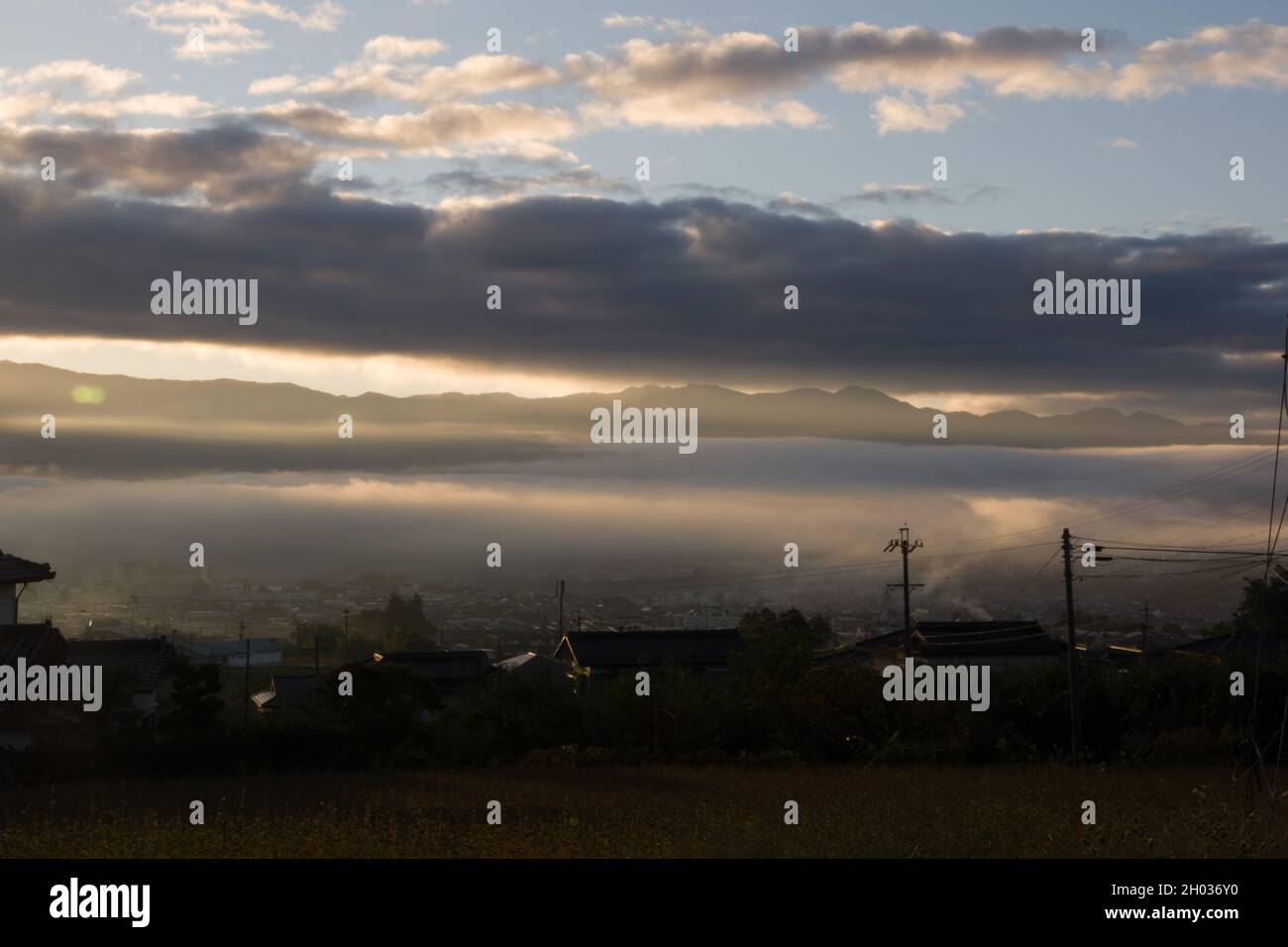 Iida, Nagano, Japan, 2021-11-10, Clouds lighted by the sun during ...