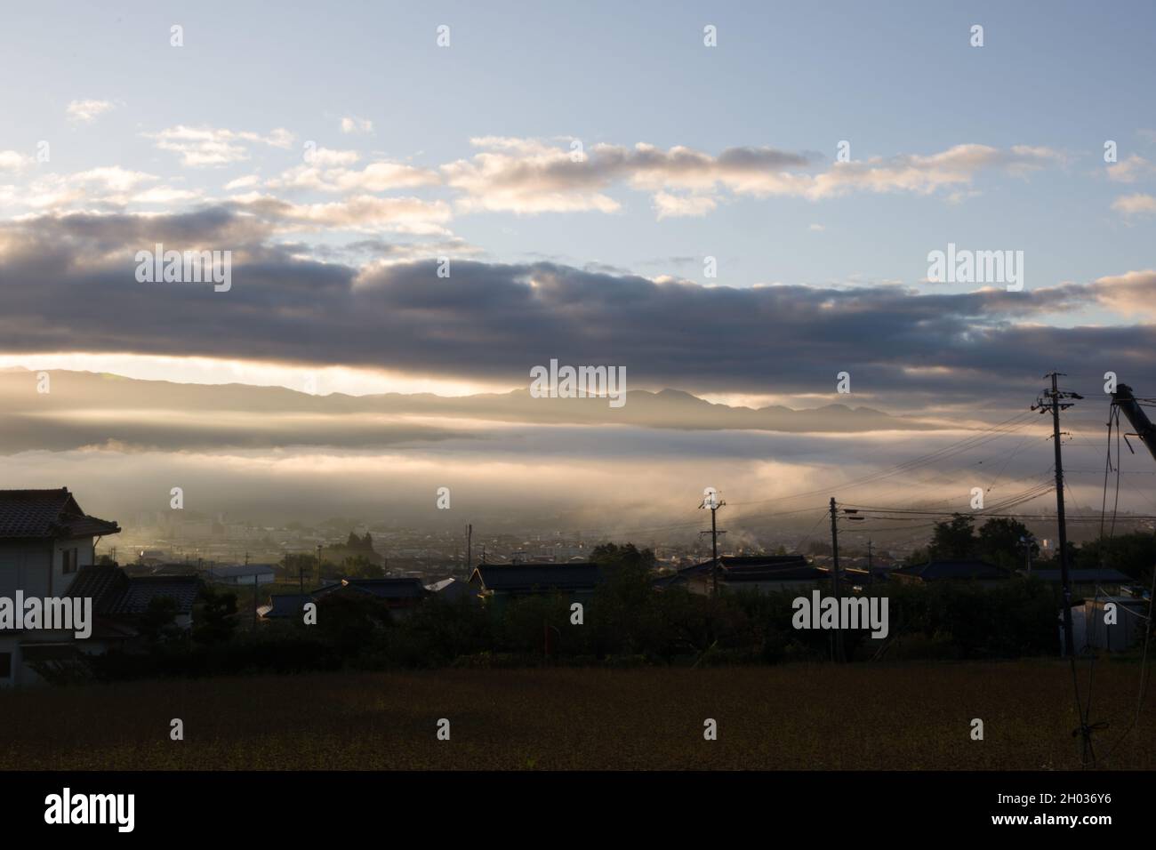 Iida, Nagano, Japan, 2021-11-10, Clouds lighted by the sun during ...