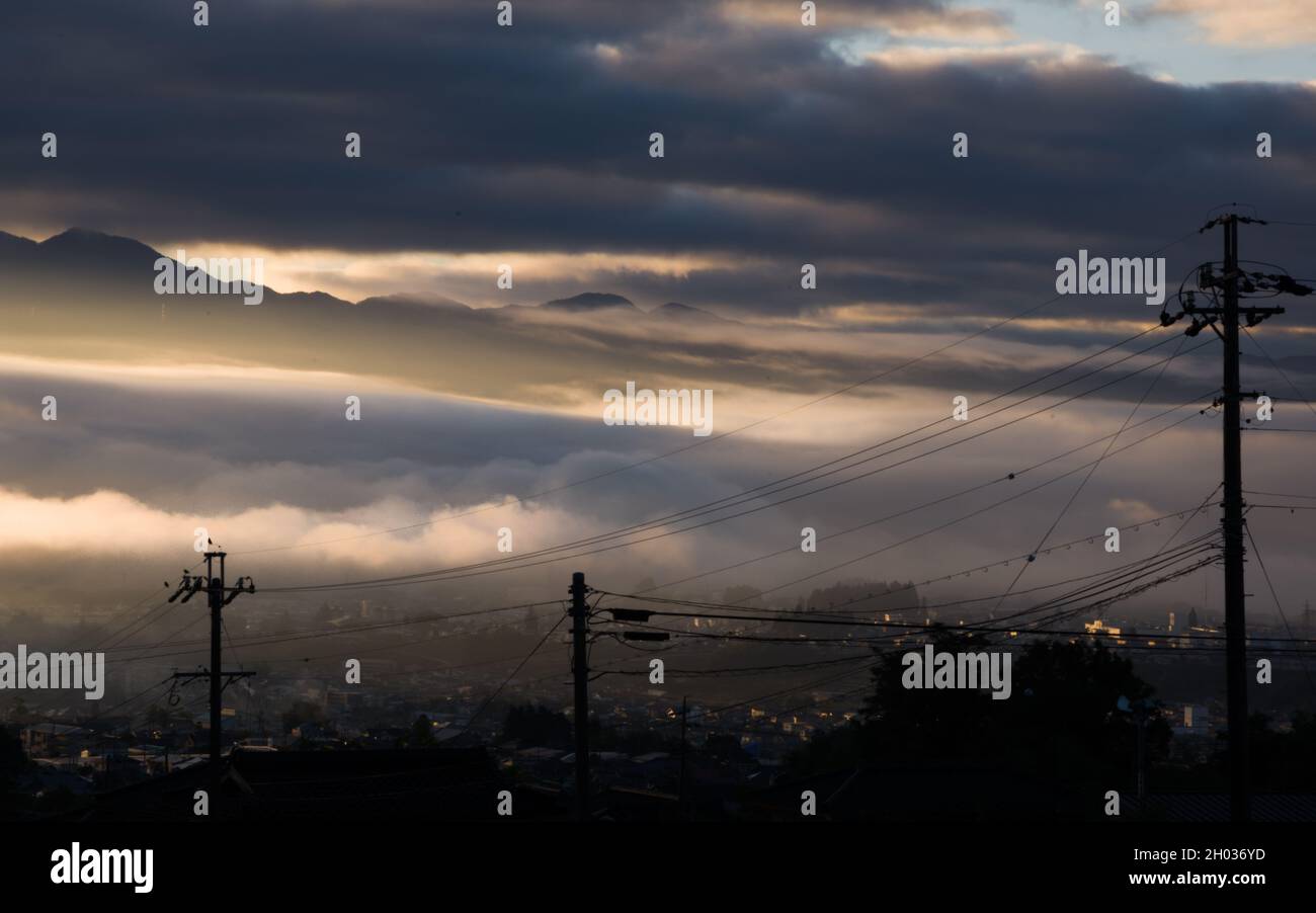 Iida, Nagano, Japan, 2021-11-10, Clouds lighted by the sun during ...