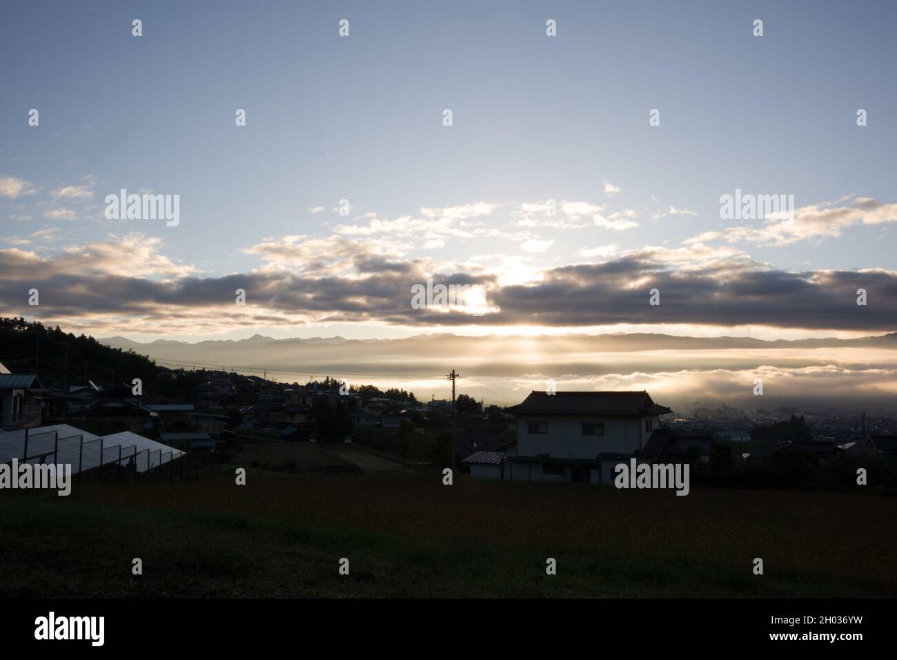 Iida, Nagano, Japan, 2021-11-10, Clouds lighted by the sun during ...