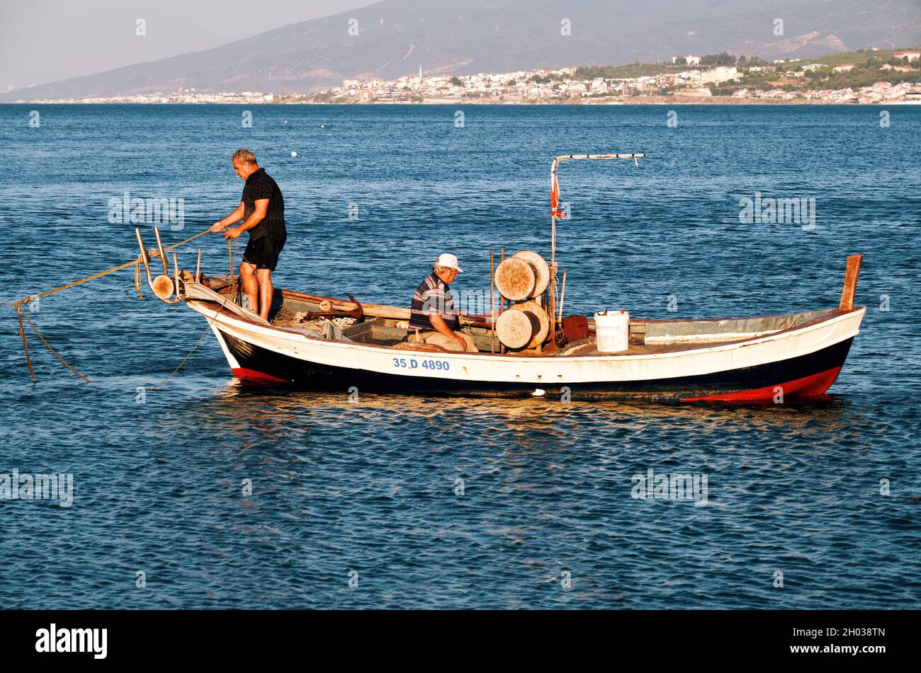 Urla, Turkey - September, 2021: Two Turkish fisherman on an old ...