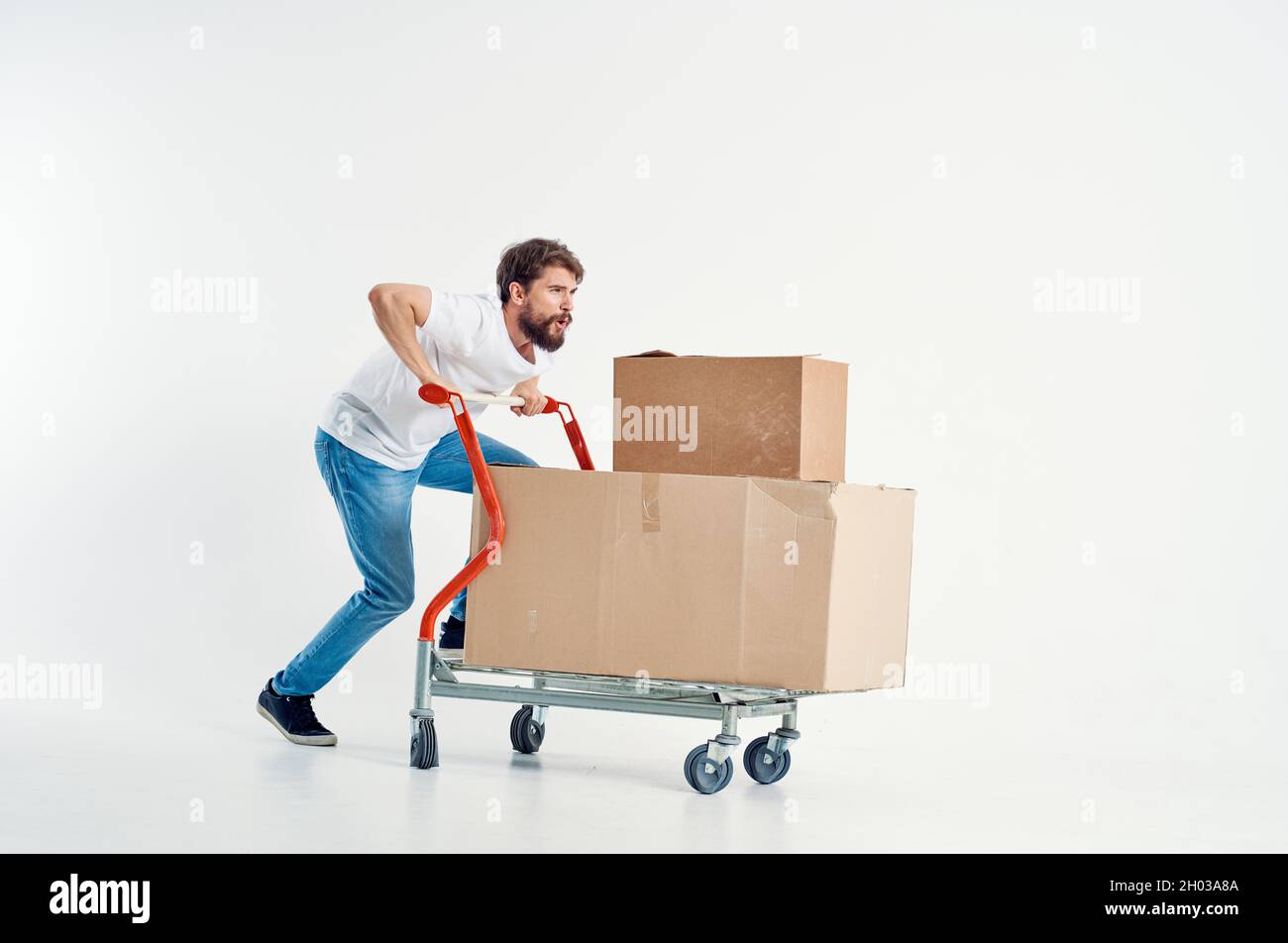 Cheerful man ride a cart entertainment isolated background Stock Photo ...