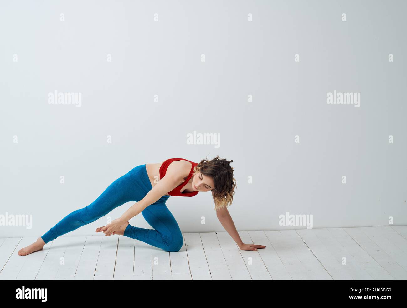 sports woman exercise workout meditation posing Stock Photo - Alamy