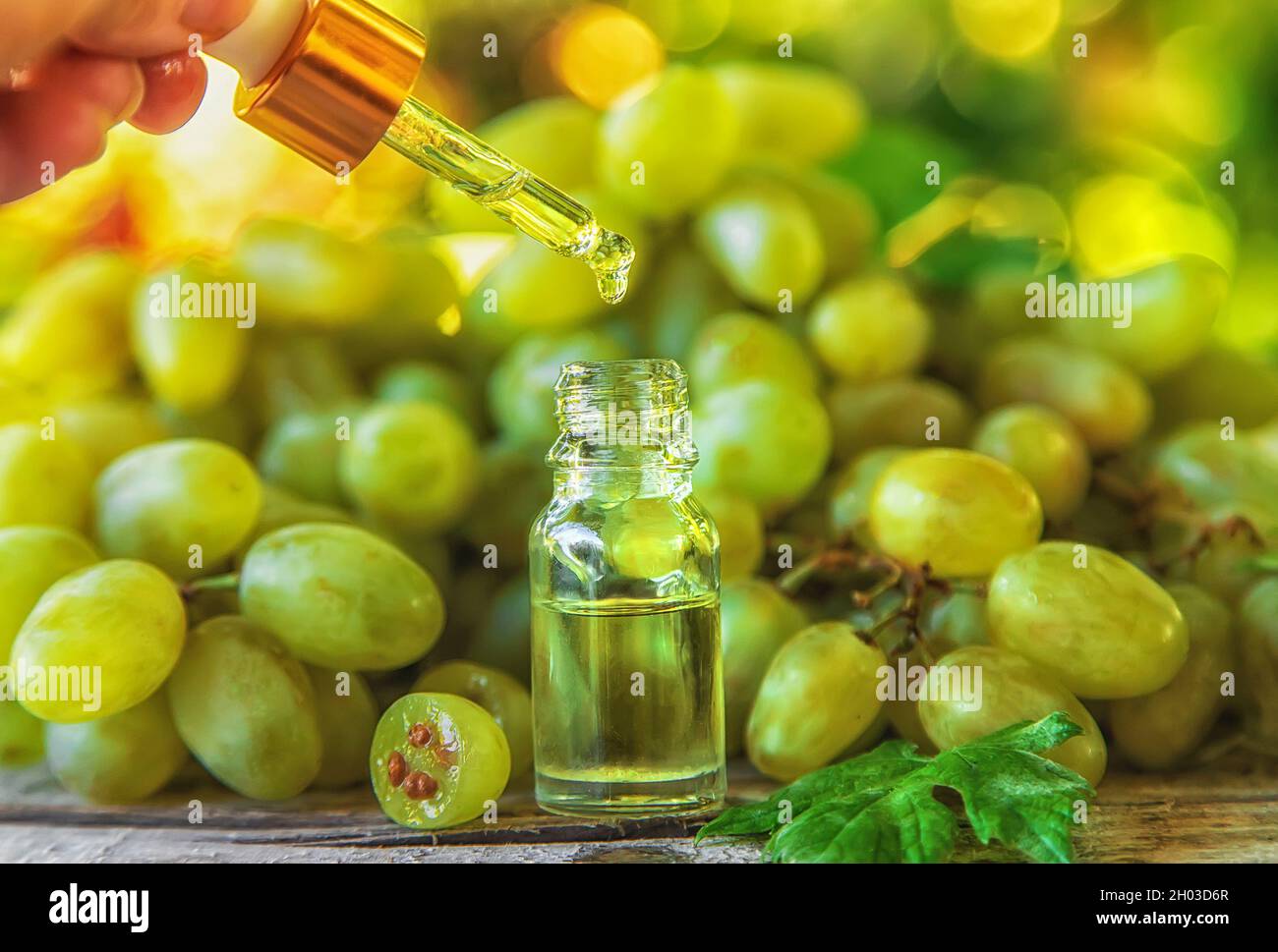 Grape seed oil in a bottle. Selective focus. Nature Stock Photo - Alamy