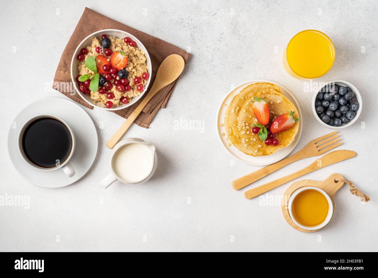 Morning served breakfast set: pancakes, porridge, cottage cheese ...