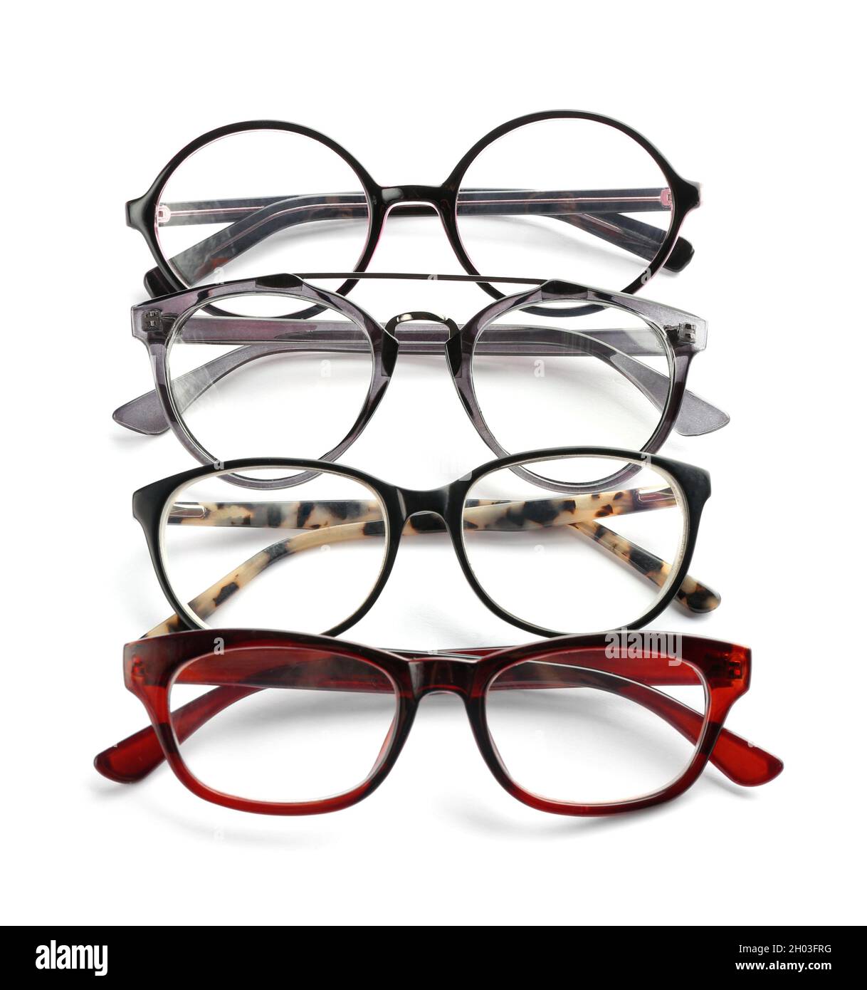 Different glasses with corrective lenses on white background. Vision ...