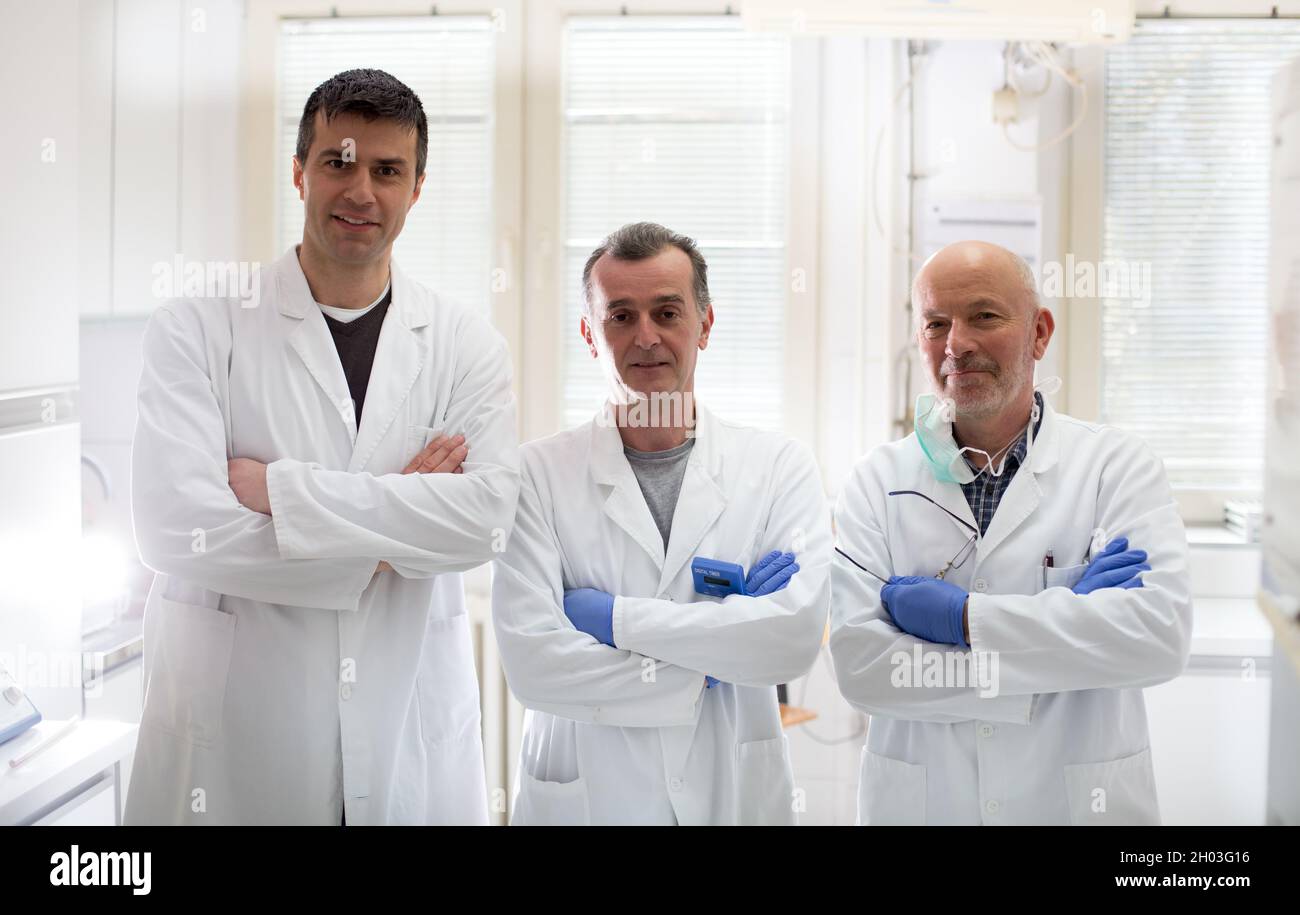 Three men posing in the uniform hi-res stock photography and images - Alamy