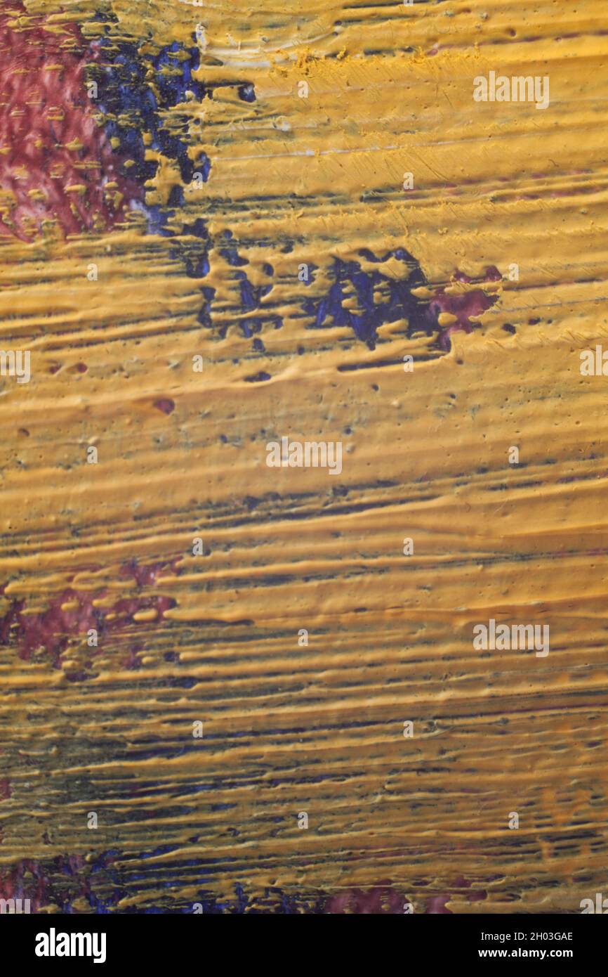 Vertical shot of a yellow oil painted surface background - can be used ...
