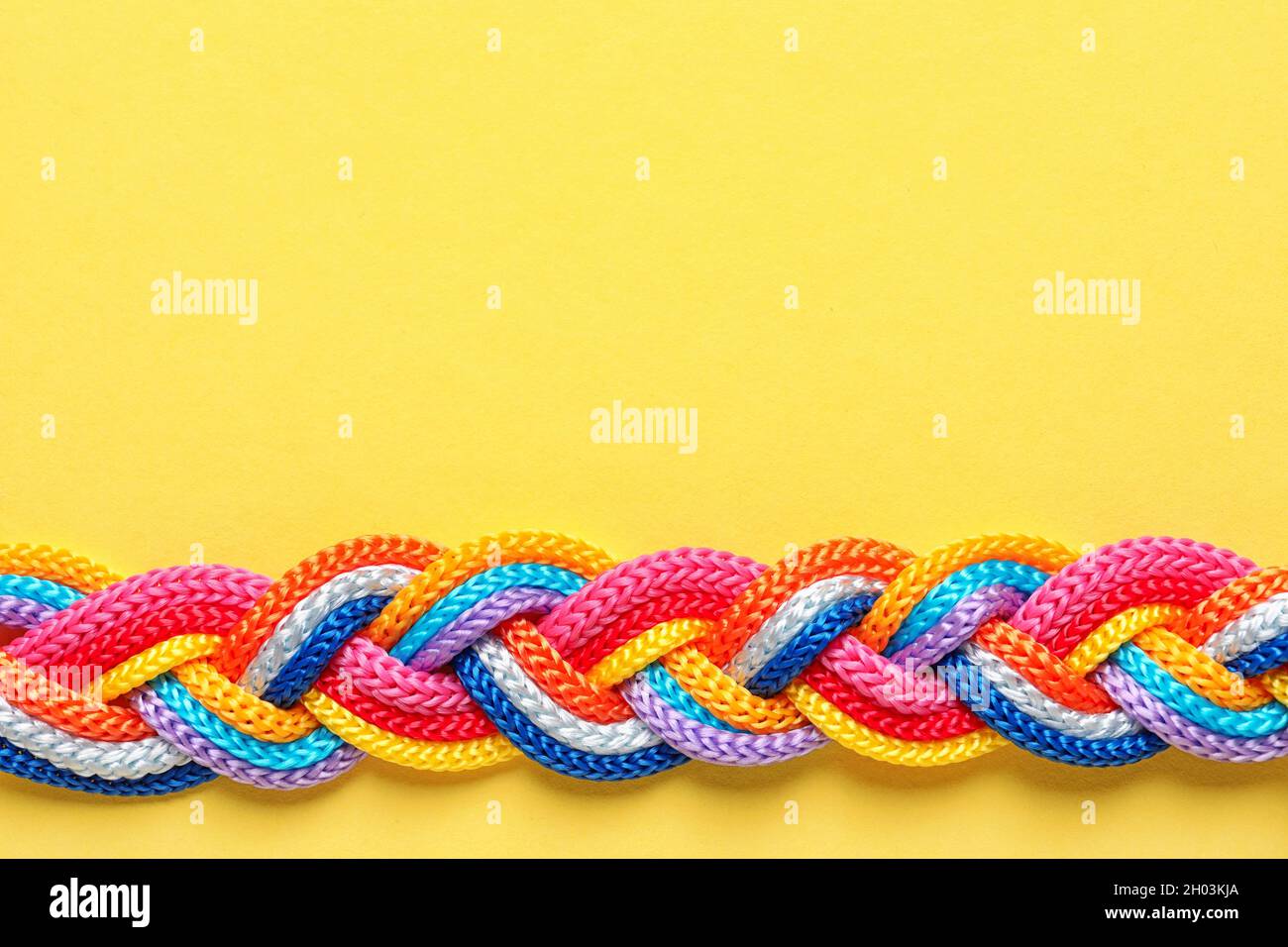 Braided ropes on color background, top view. Unity concept Stock Photo ...