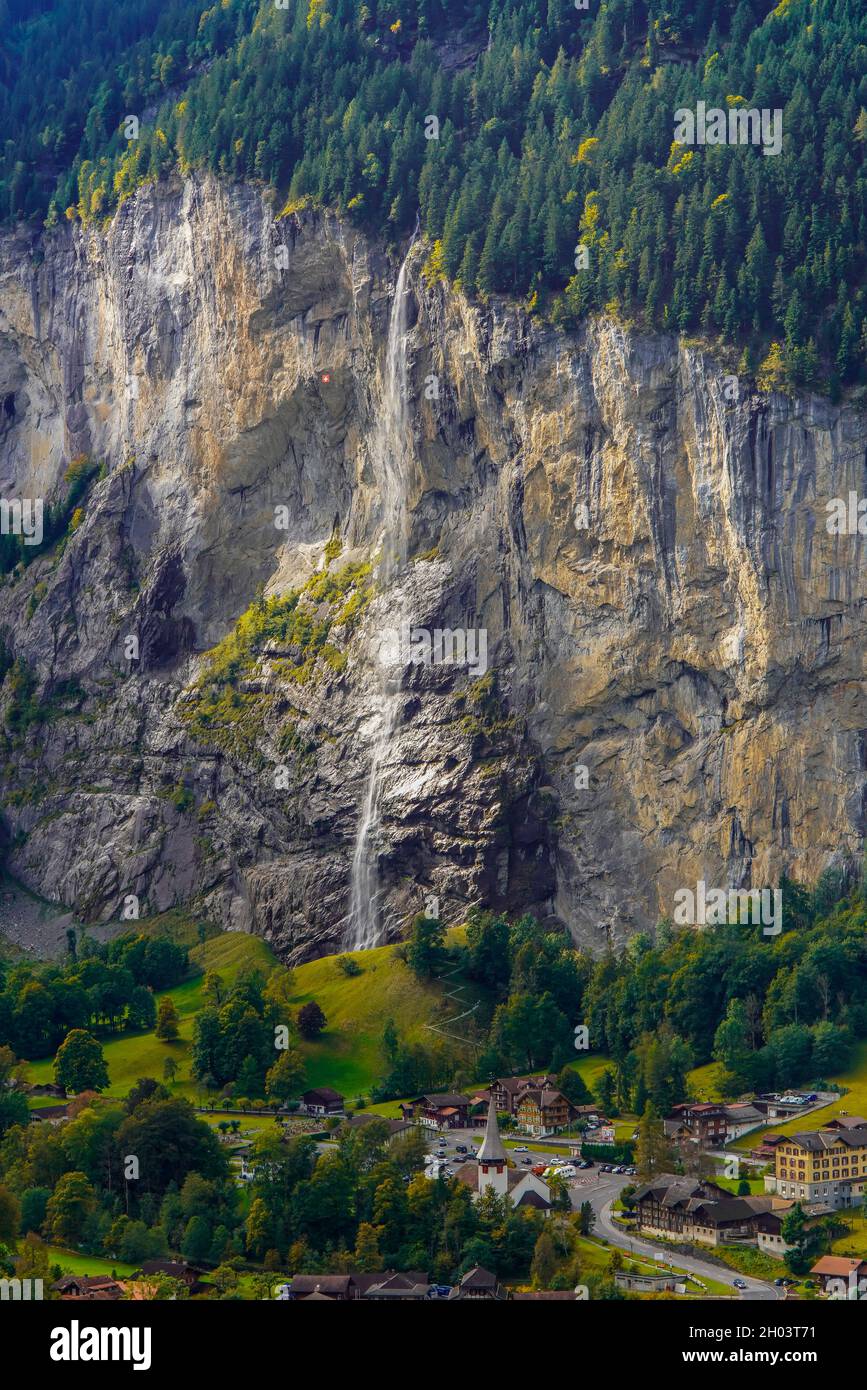 View of Staubbach Falls falling from a high cliff by Lauterbrunnen ...