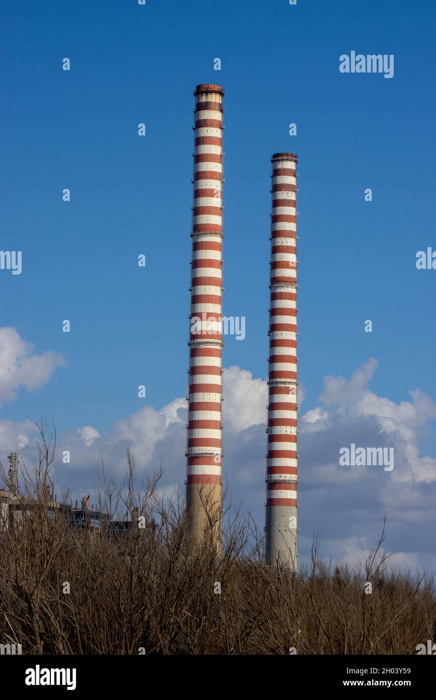 Red and white industrial chimneys in Tuscany 2 Stock Photo - Alamy