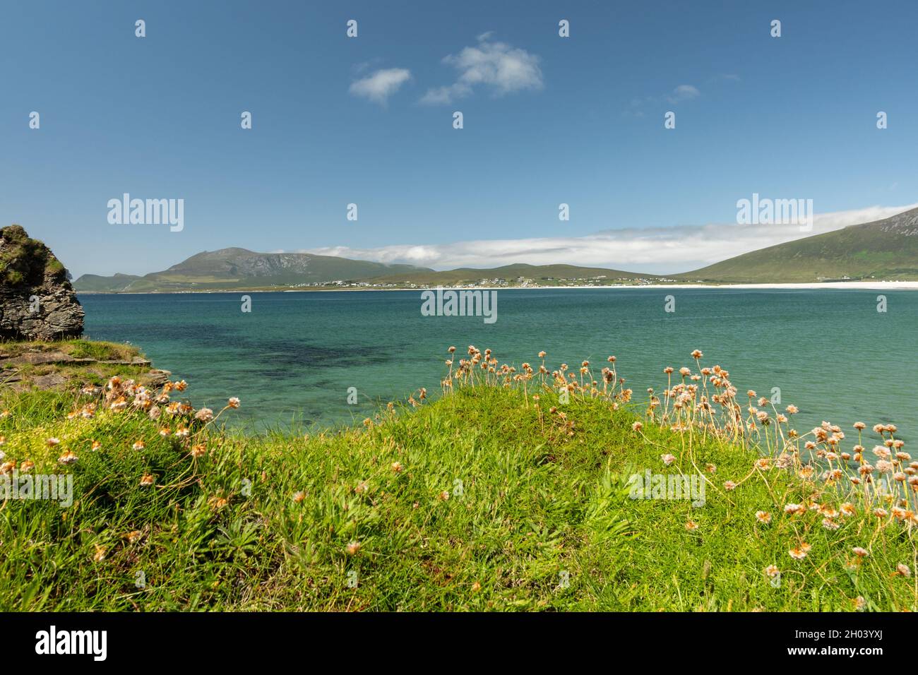Shot of a grassy coastline at the Keel beach, Achill Island, County ...