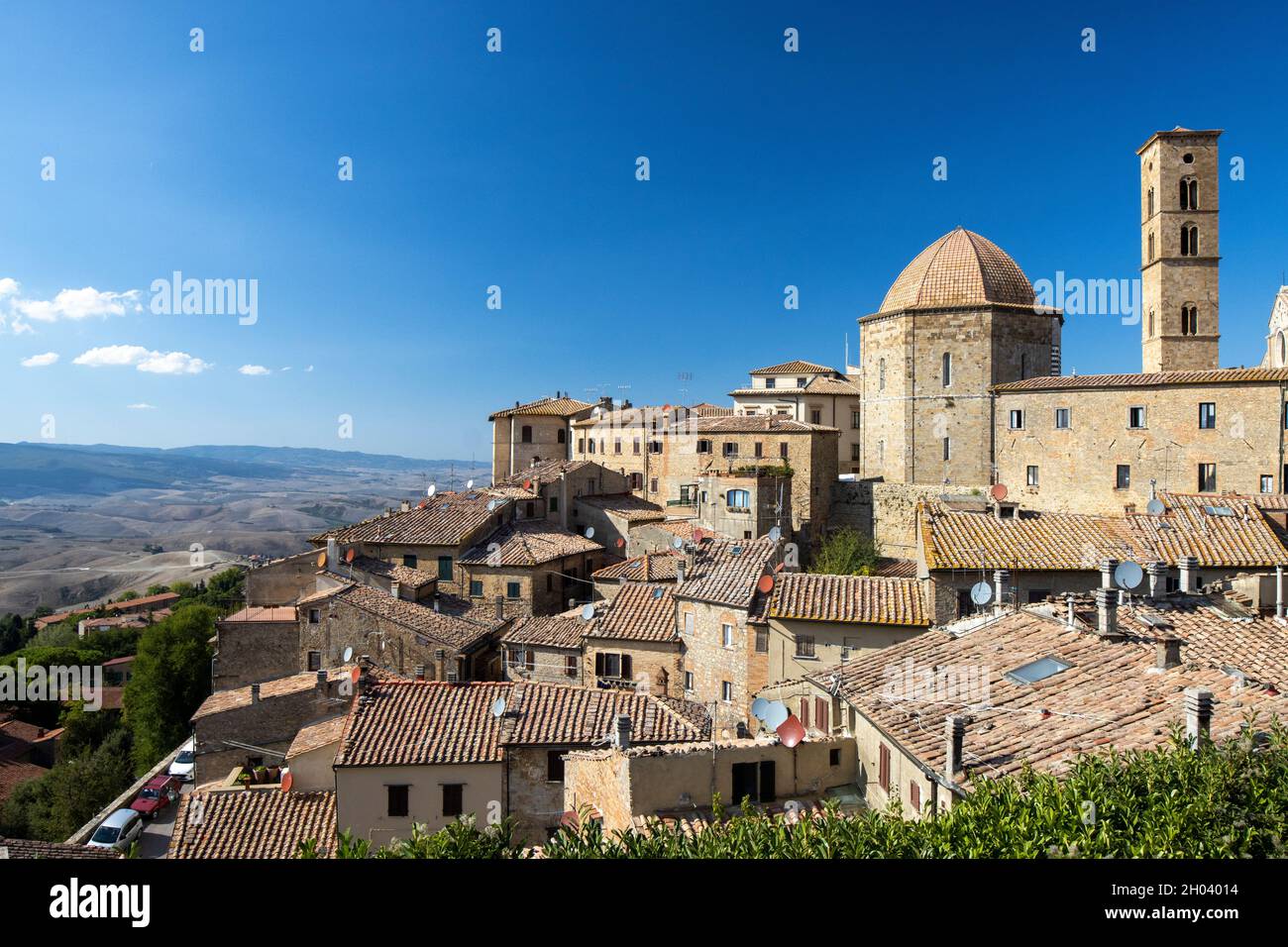 The medieval town of Volterra in Tuscany Italy. With houses, church and ...