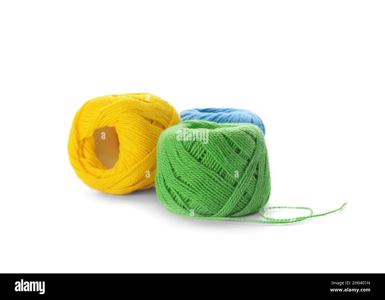 Color threads on white background Stock Photo - Alamy