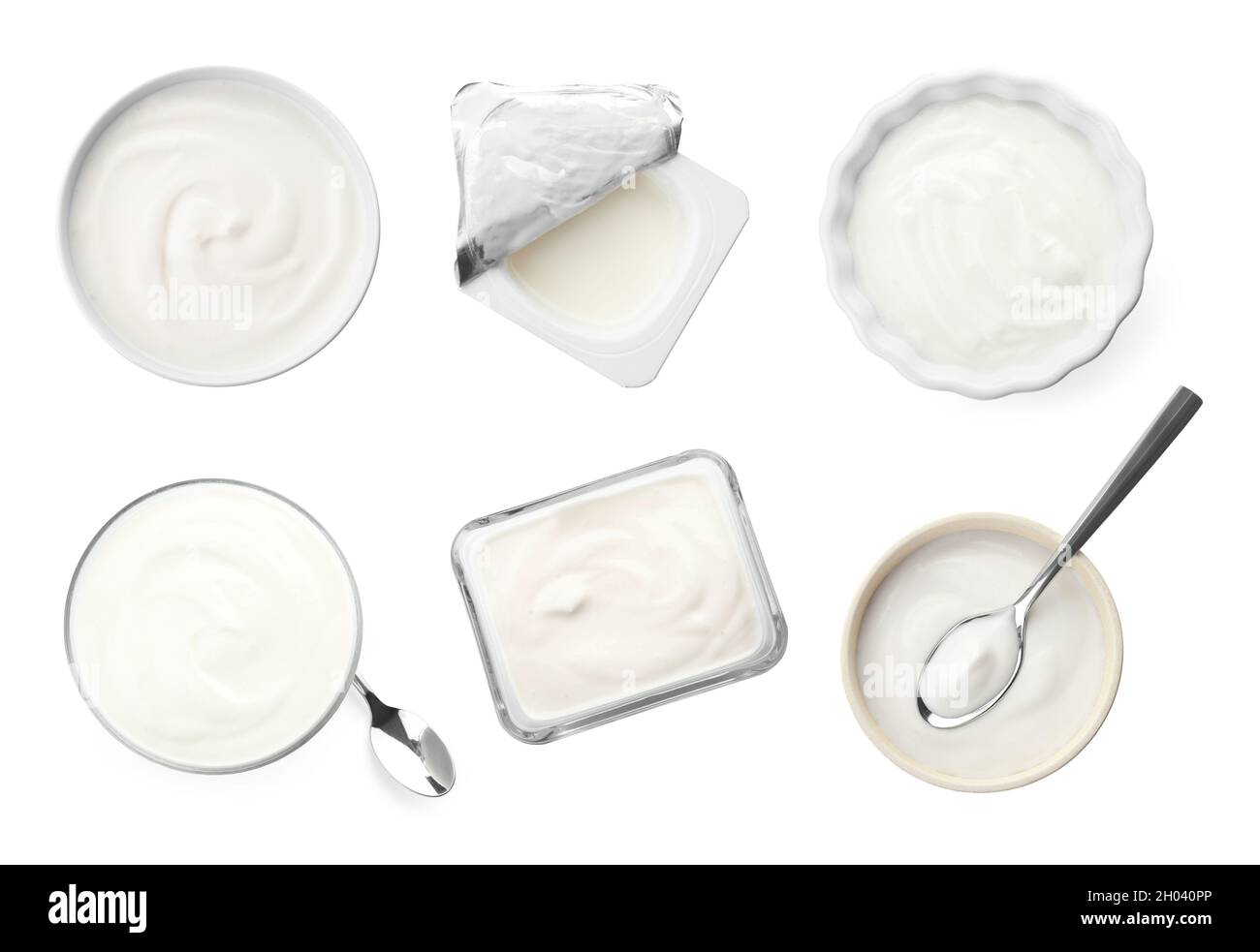 Set with delicious yogurt on white background, top view Stock Photo - Alamy