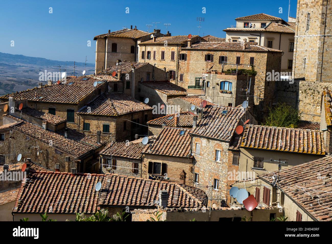 The medieval town of Volterra in Tuscany Italy. With houses, church and ...