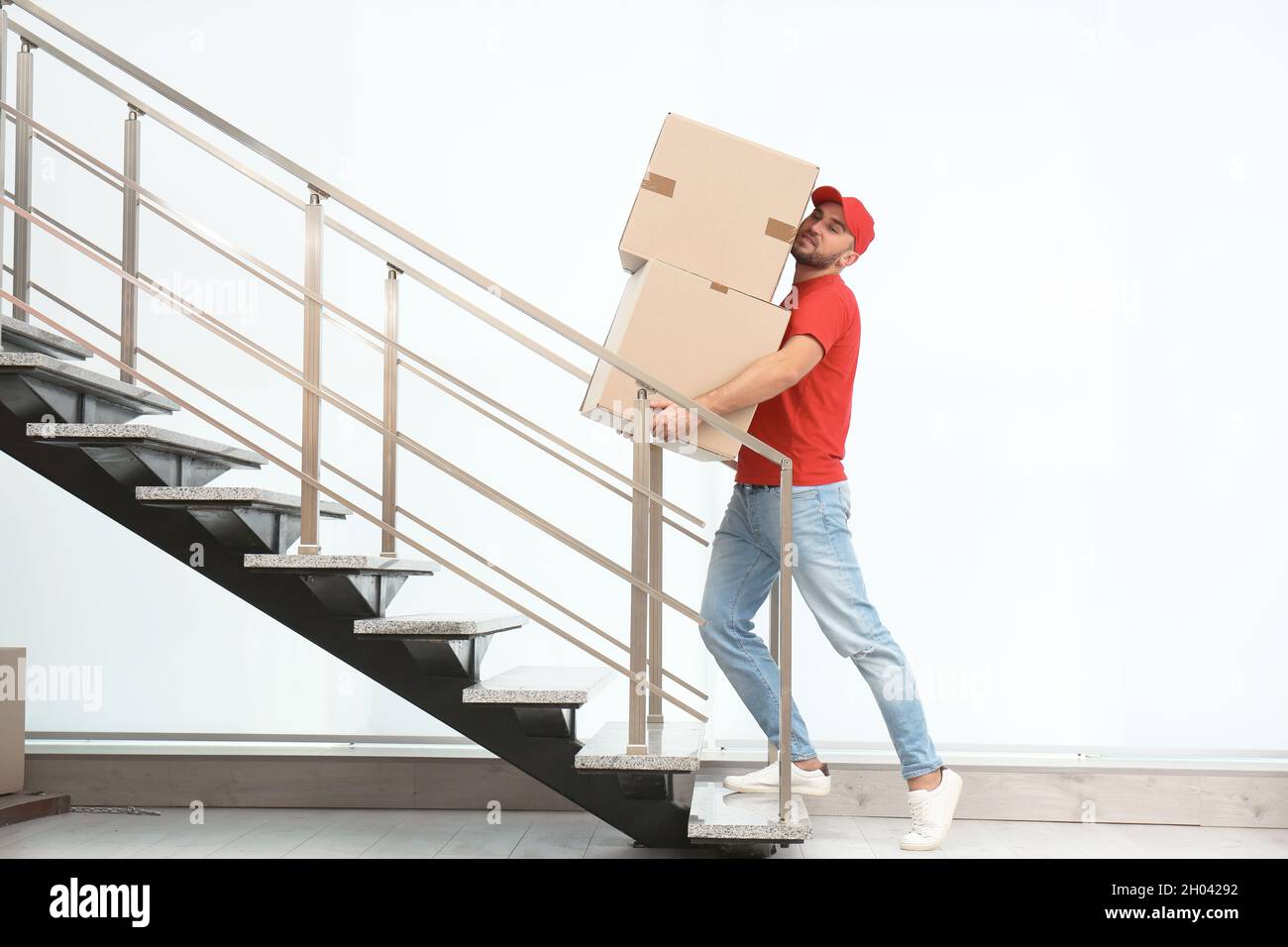 Man Carrying Boxes Stairs High Resolution Stock Photography and Images ...