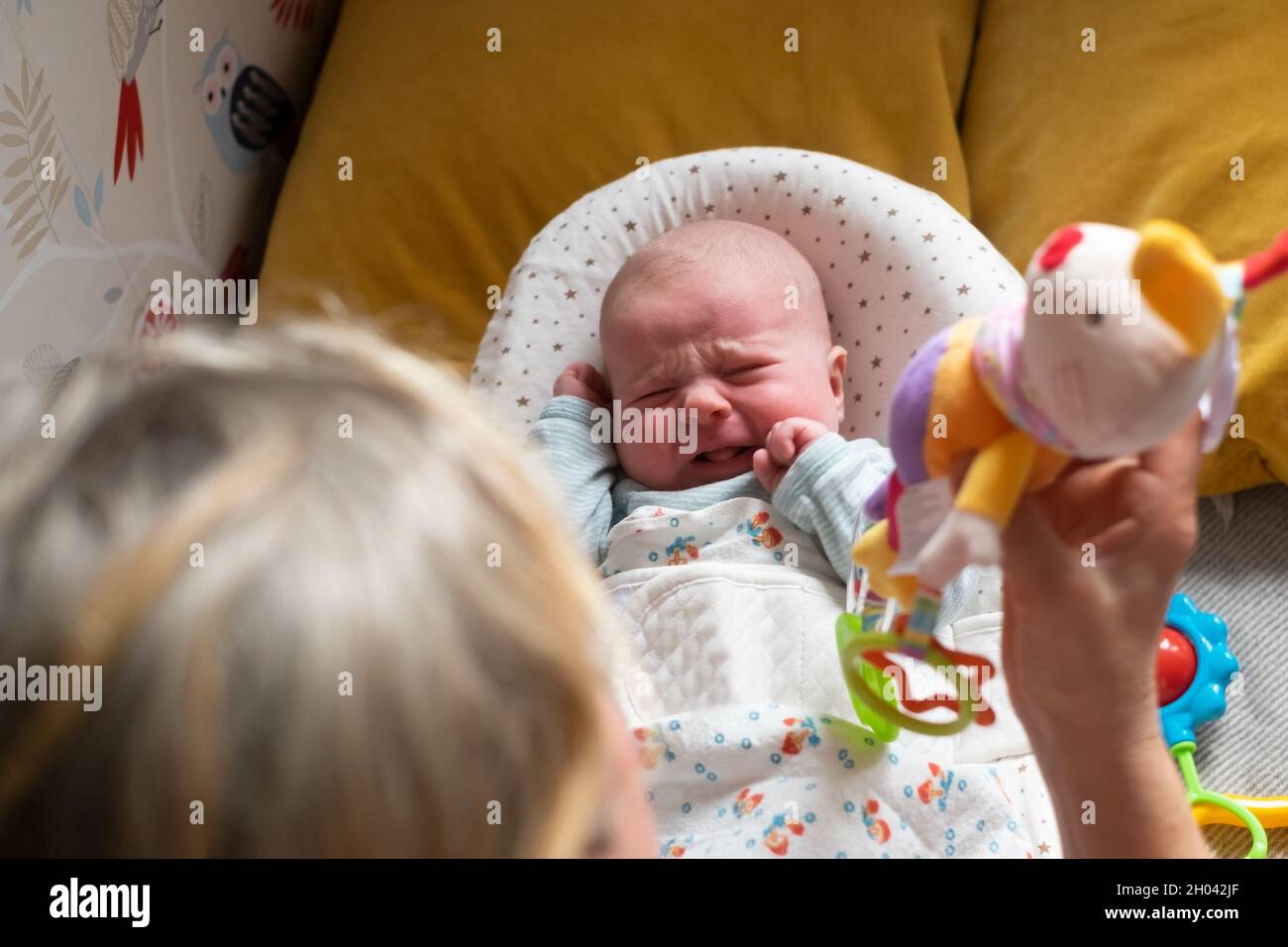 Child cry toy hi-res stock photography and images - Alamy