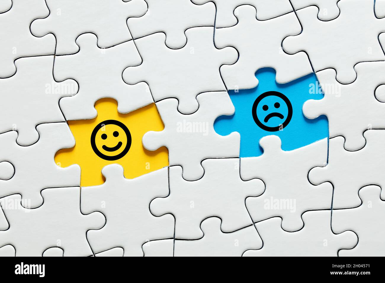Missing puzzle pieces with happy and sad face icons. Customer ...