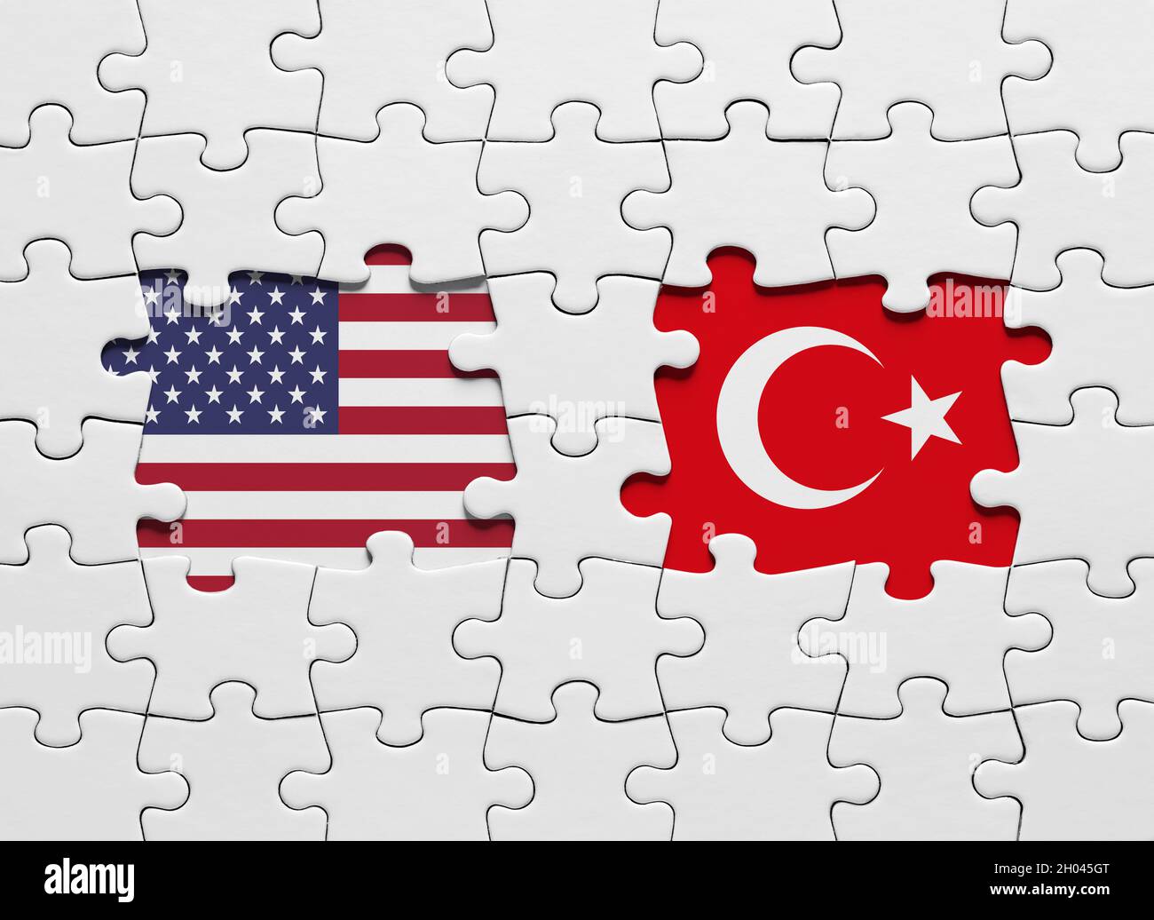 Jigsaw puzzle with the national flags of United States of America and ...